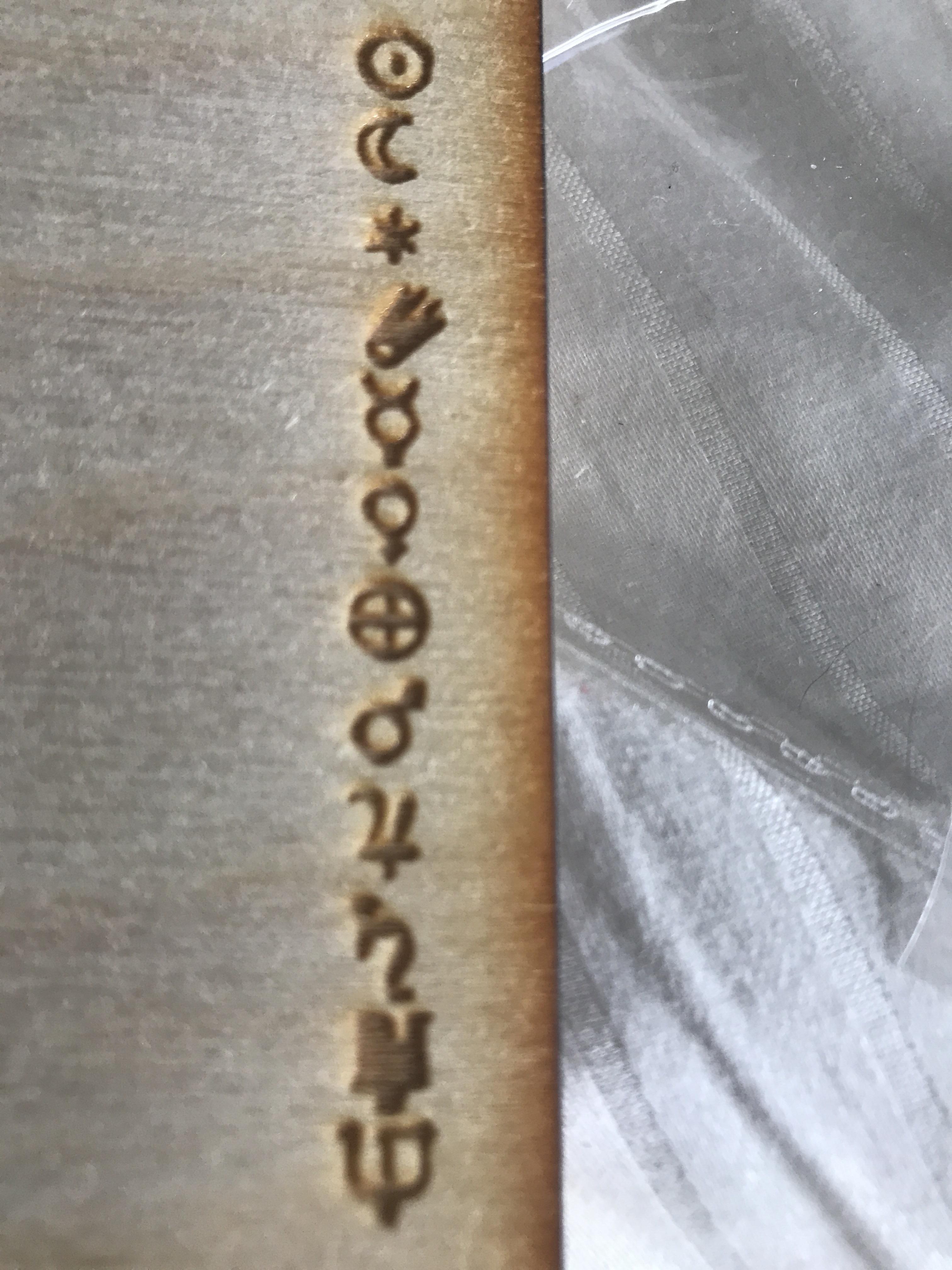 Does anyone know what these symbols mean? | Scrolller