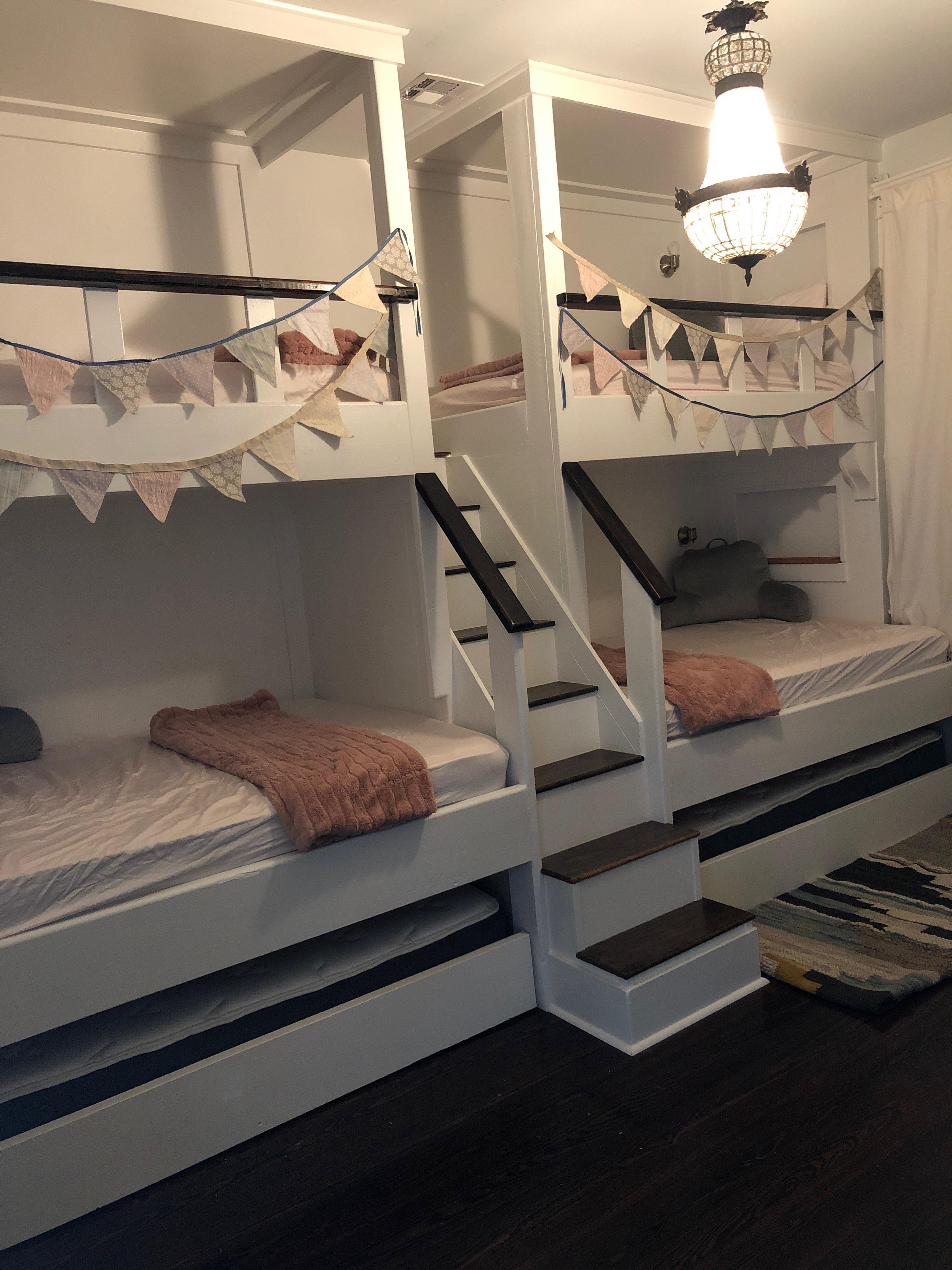 Double bunk beds for my army of daughters. Twin over full with twin trundles. Slumber party ...