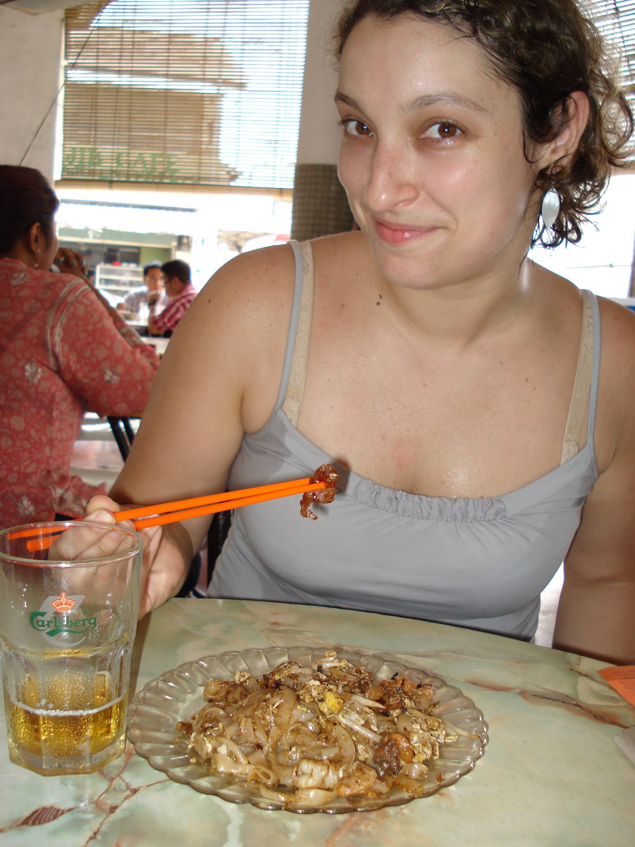 Eating lunch outdoors in Penang, Malaysia | Scrolller