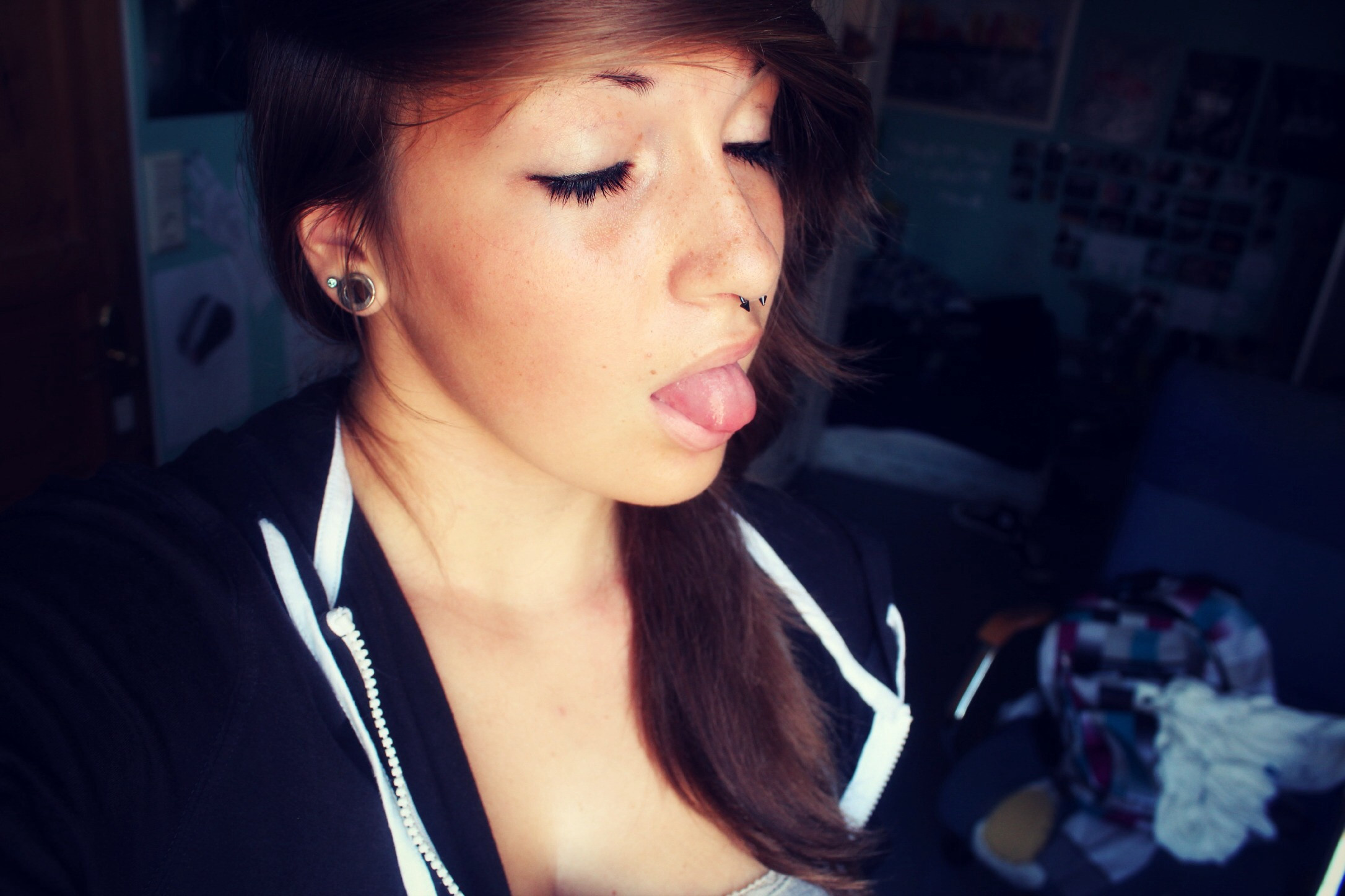 Eyes closed in her room | Scrolller