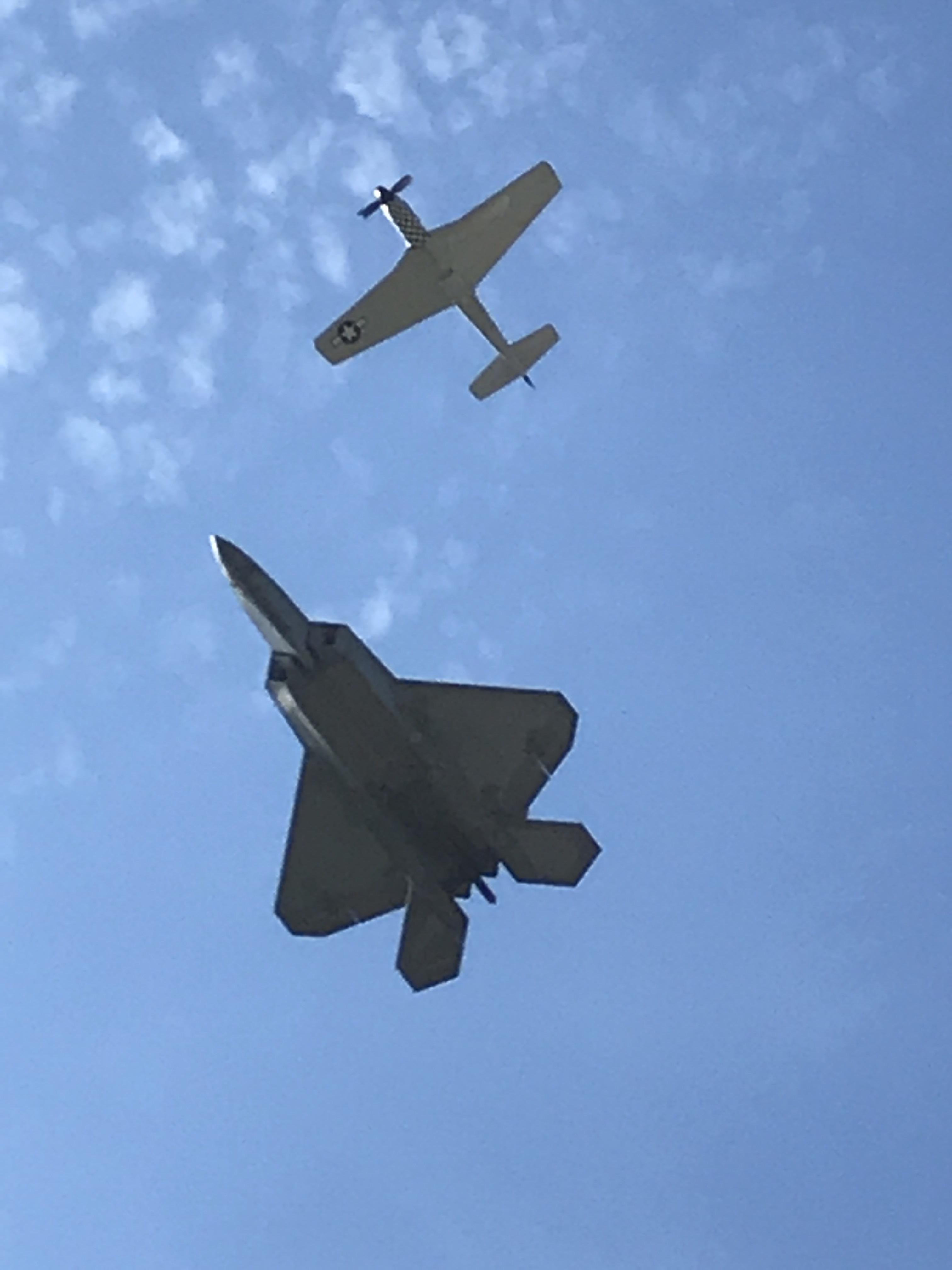F-22 and P-51 Flying overhead | Scrolller