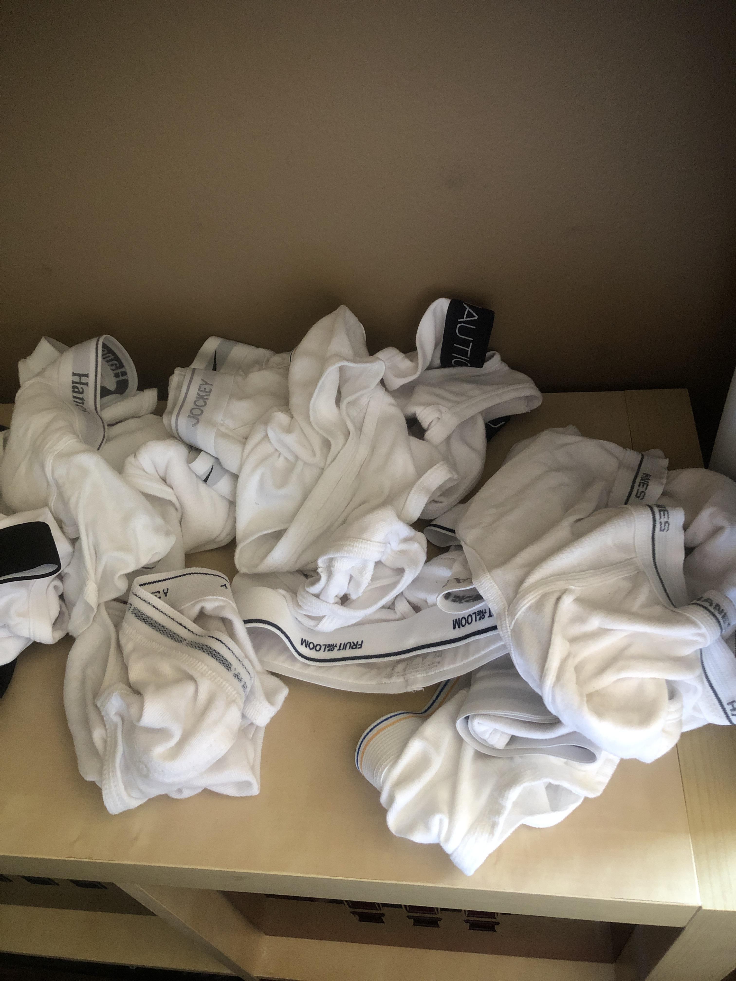 Folding some laundry. | Scrolller