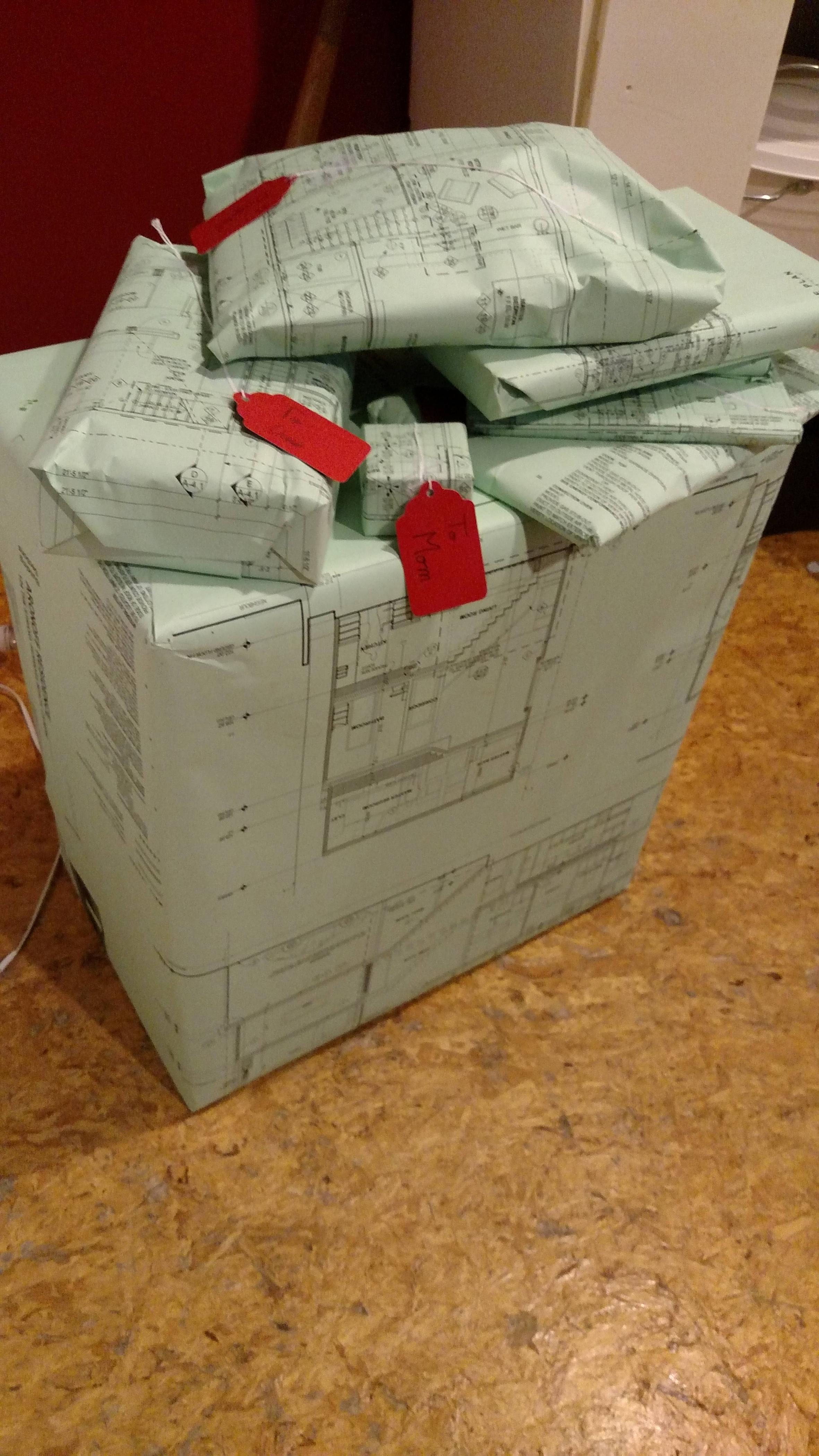 Forget Christmas wrap use old construction drawings to wrap your holiday gifts. Everyone will ...
