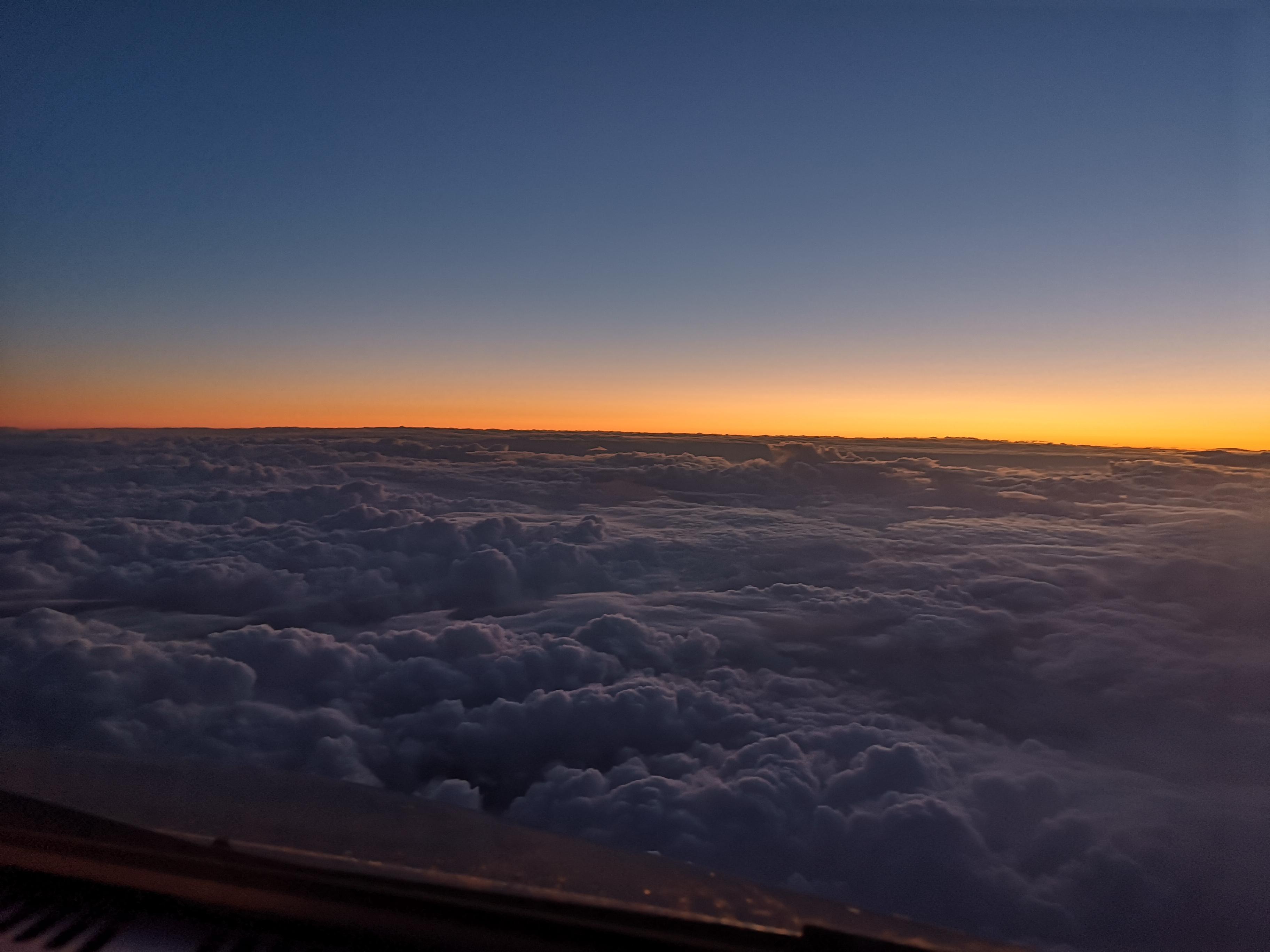 Frontal clouds obscuring a sunset at 20'000 feet | Scrolller
