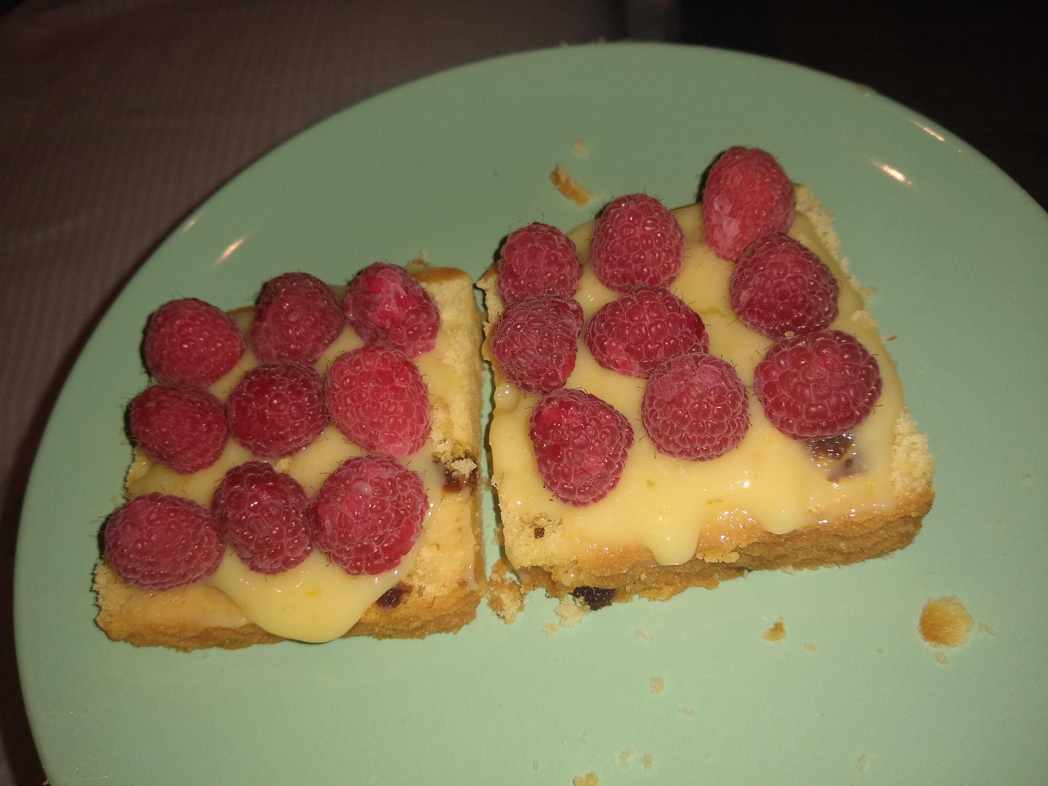 Fruit loaf, lemon curd, raspberries. | Scrolller