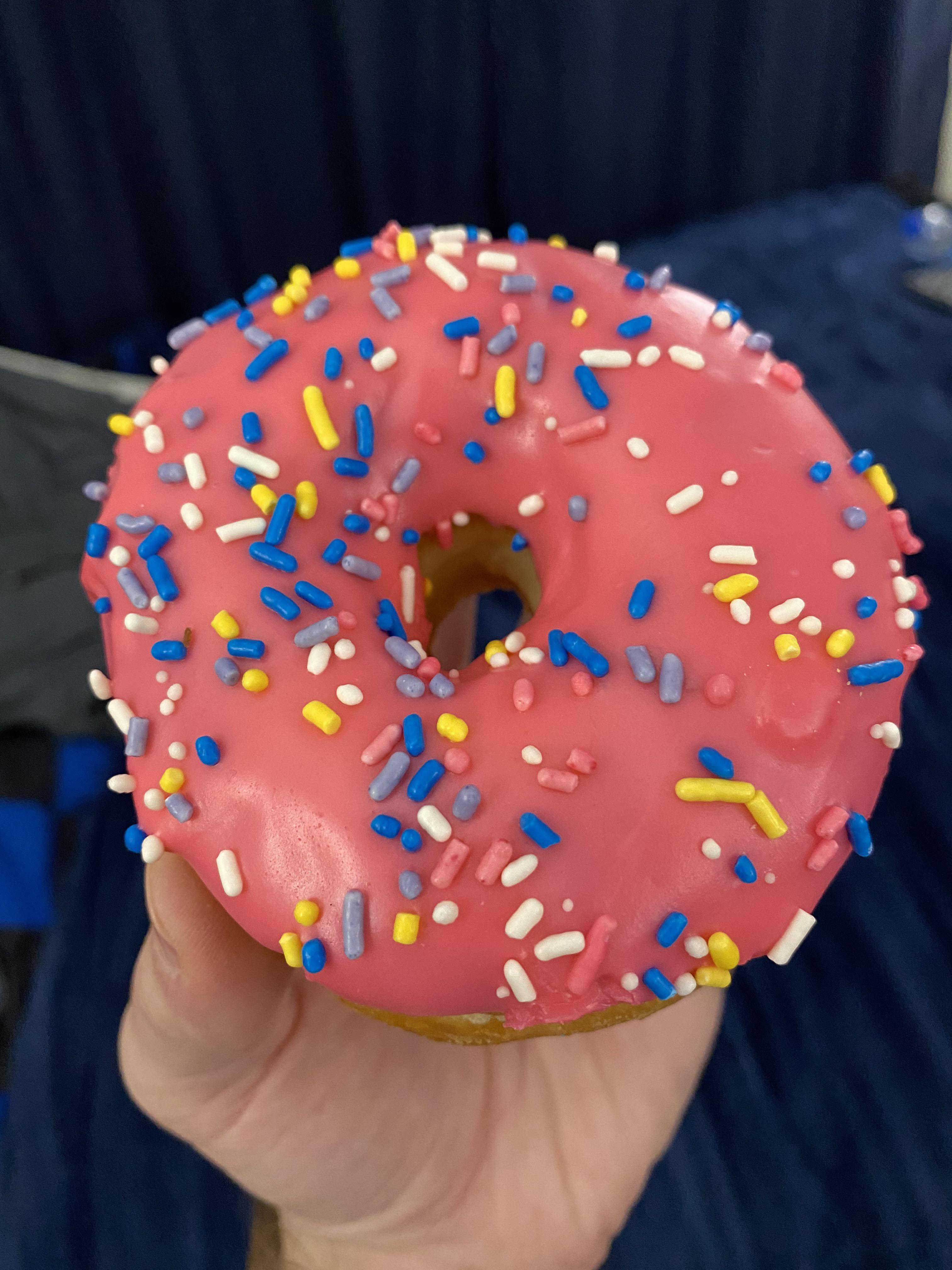 Giant pink donut with sprinkles | Scrolller