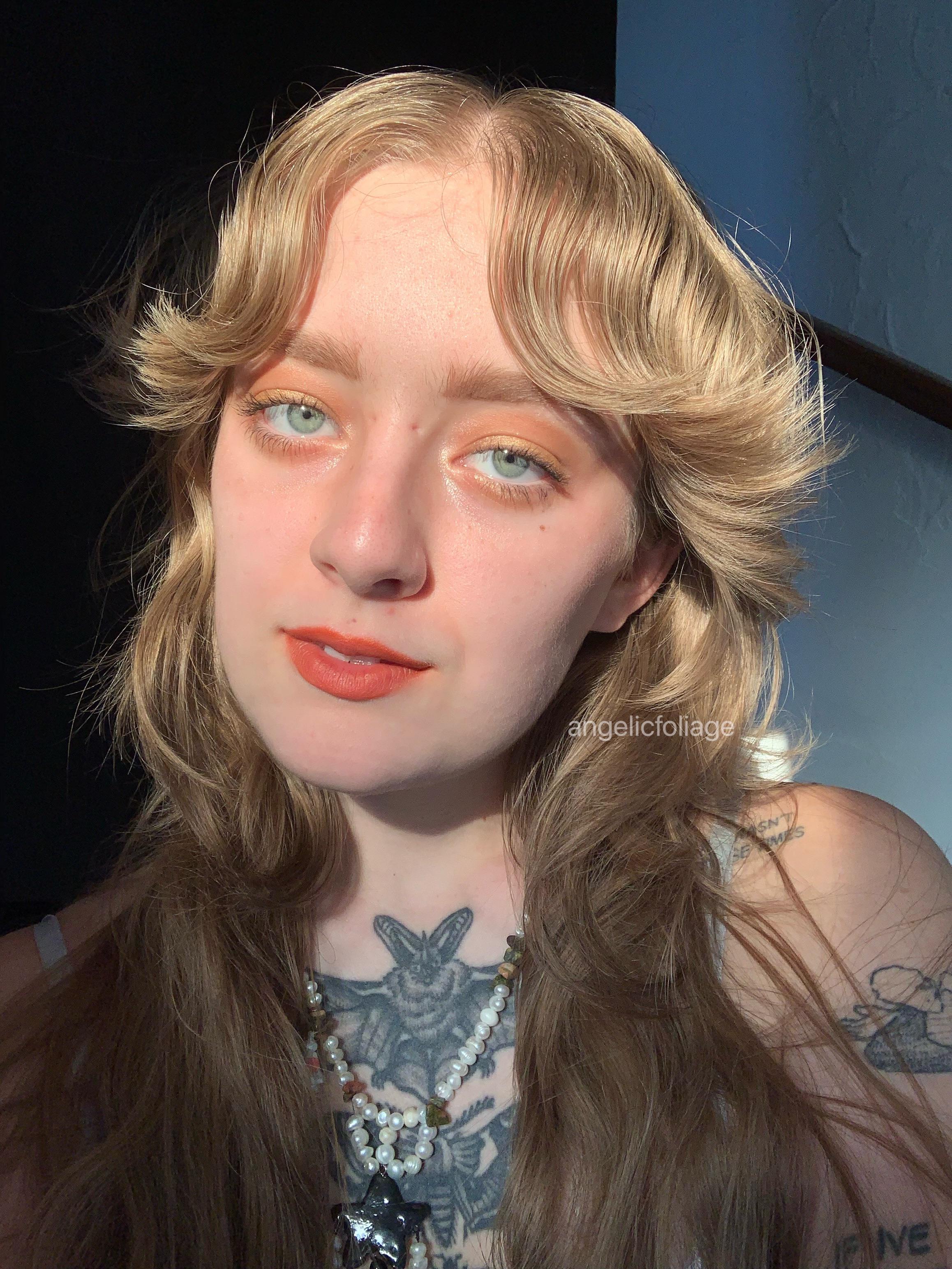 golden hour, mint green eyes in warm makeup | Scrolller