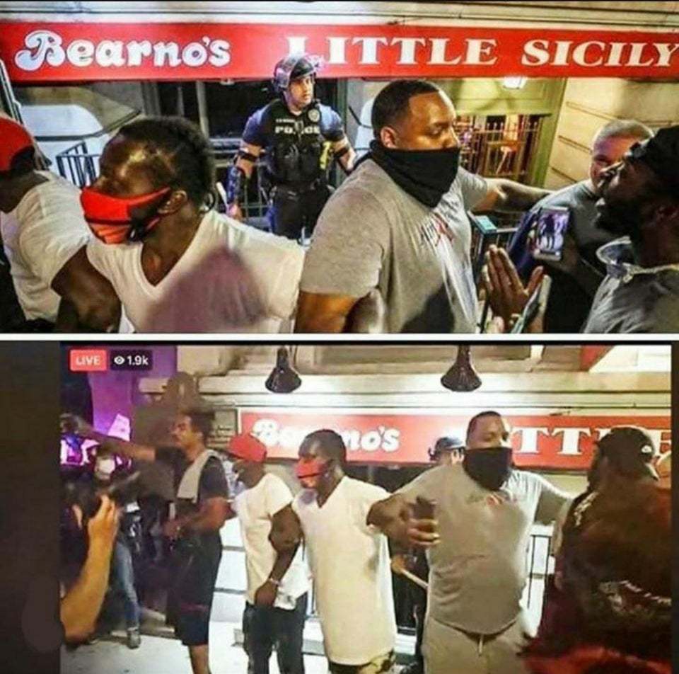 Group of men surround to protect outnumbered police officer. | Scrolller