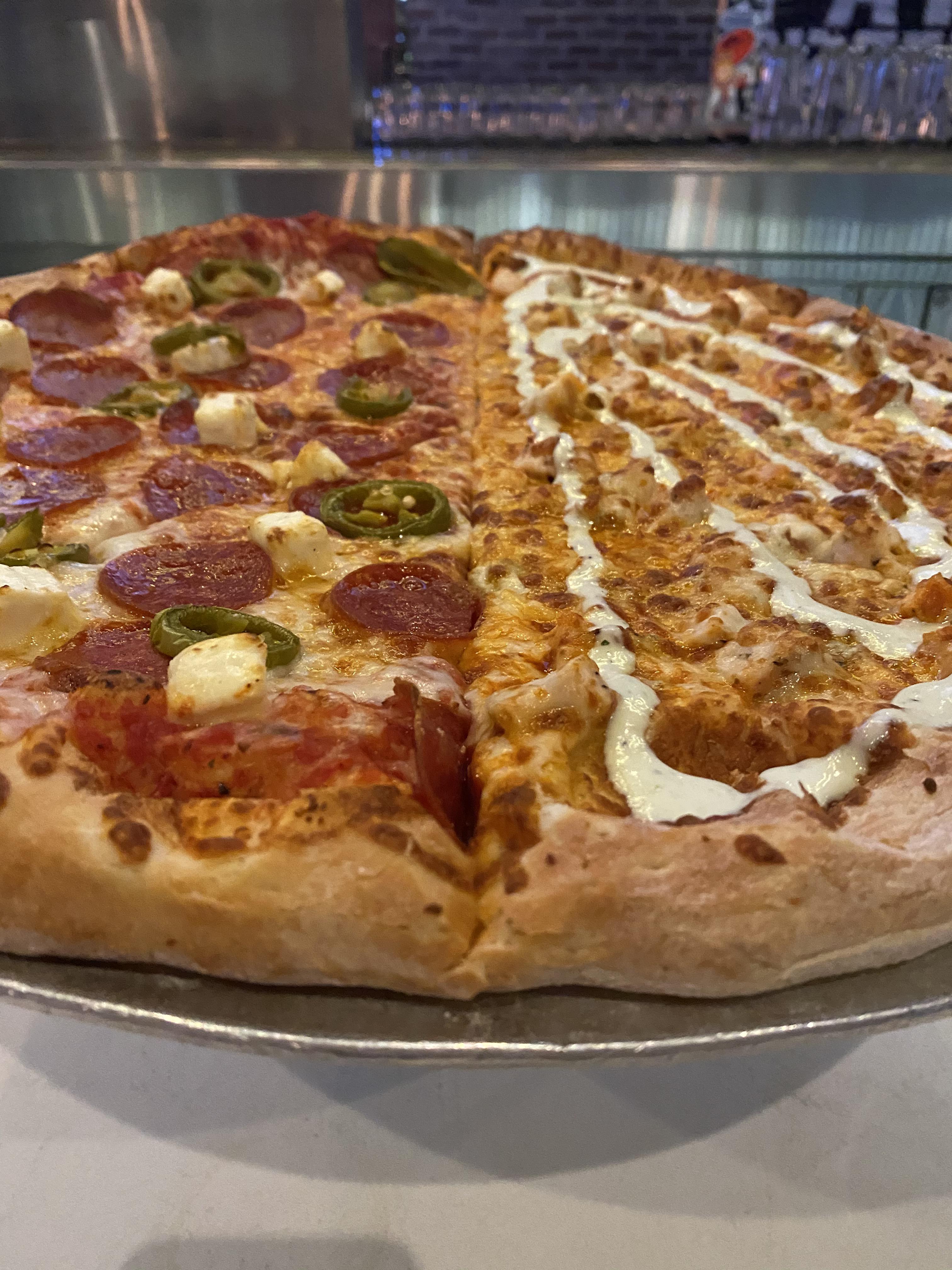 Half pepperoni and jalapeño, Half Buffalo chicken. All delish. | Scrolller