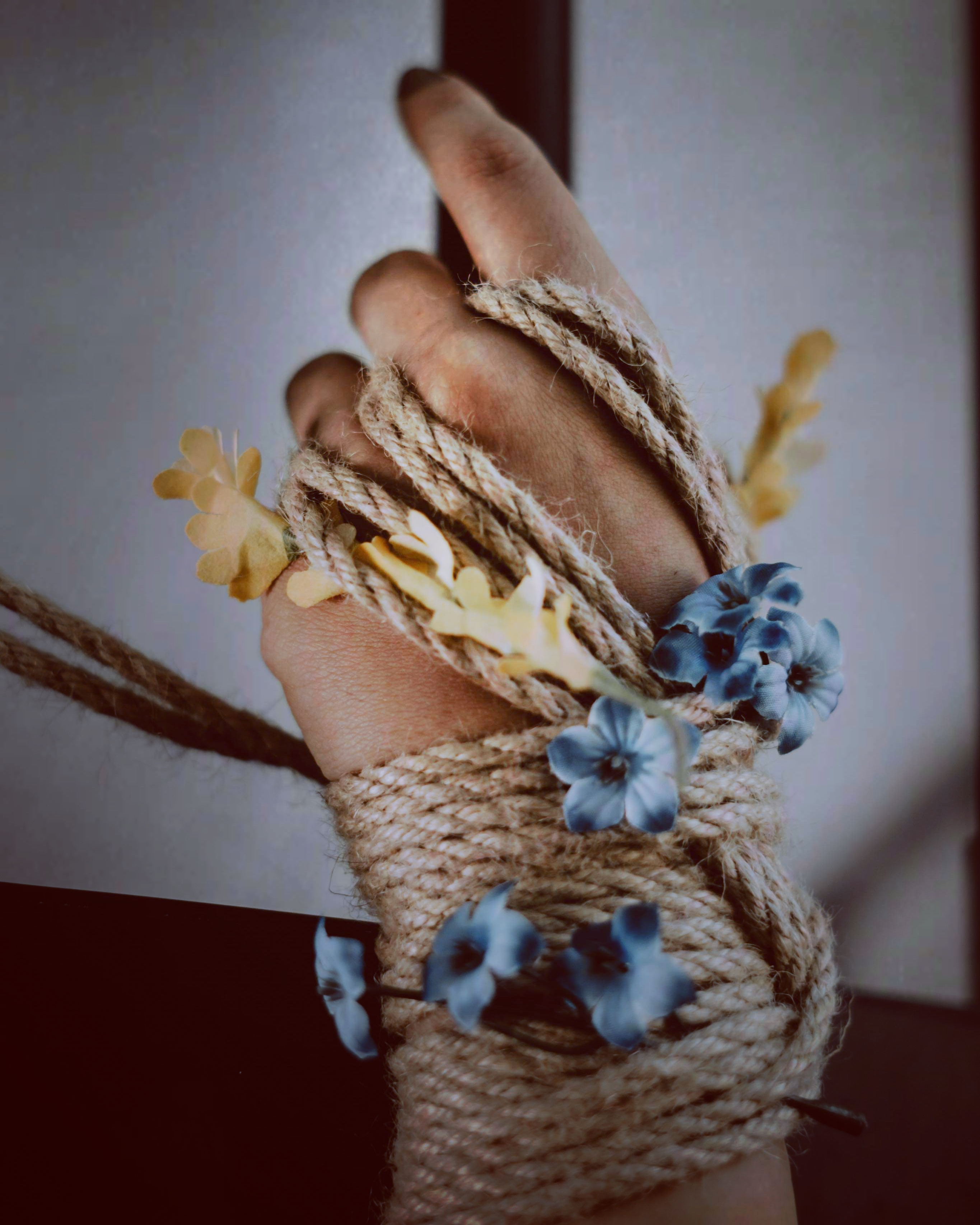 Hand bind and flowers | Scrolller