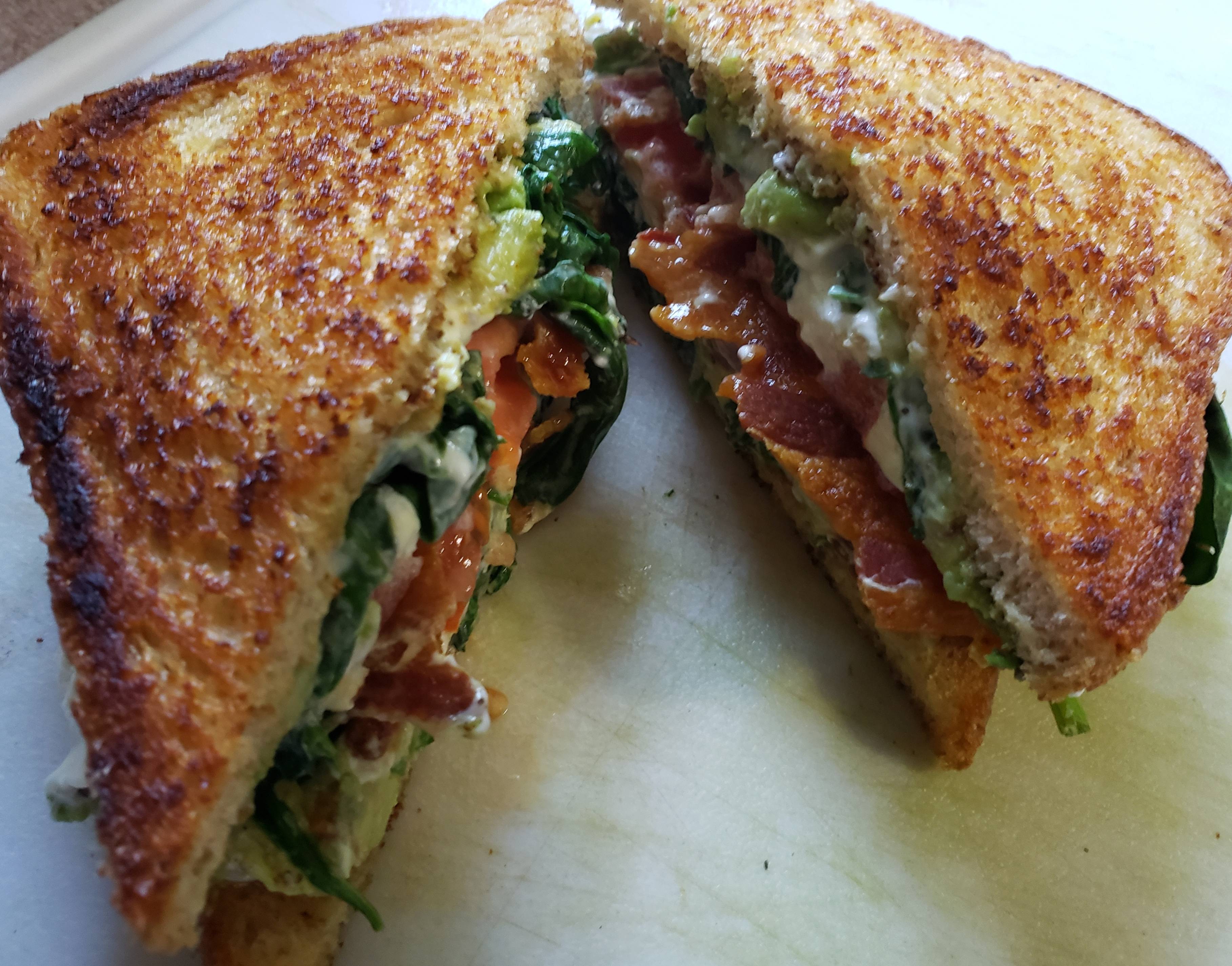 [Homemade] Bacon, spinach, avocado, and tomato sandwich with goat cheese | Scrolller