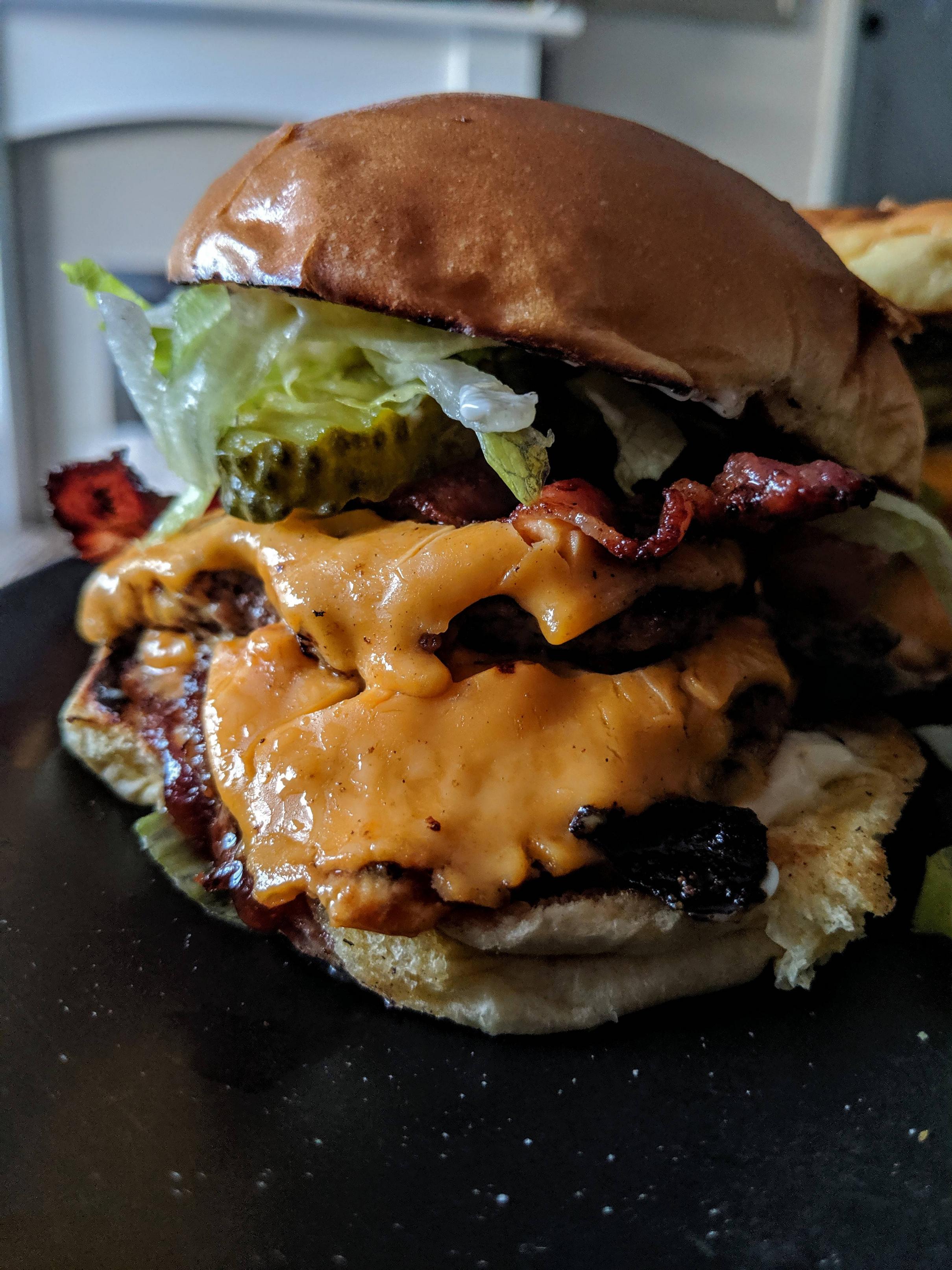 [homemade] Burger night. Brioche bun, smokey bacon, cheese and double ...