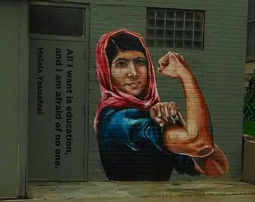 Houston, Texas: Malala meets Rosie the Riveter (x-post from /r/pics)[499x395] | Scrolller