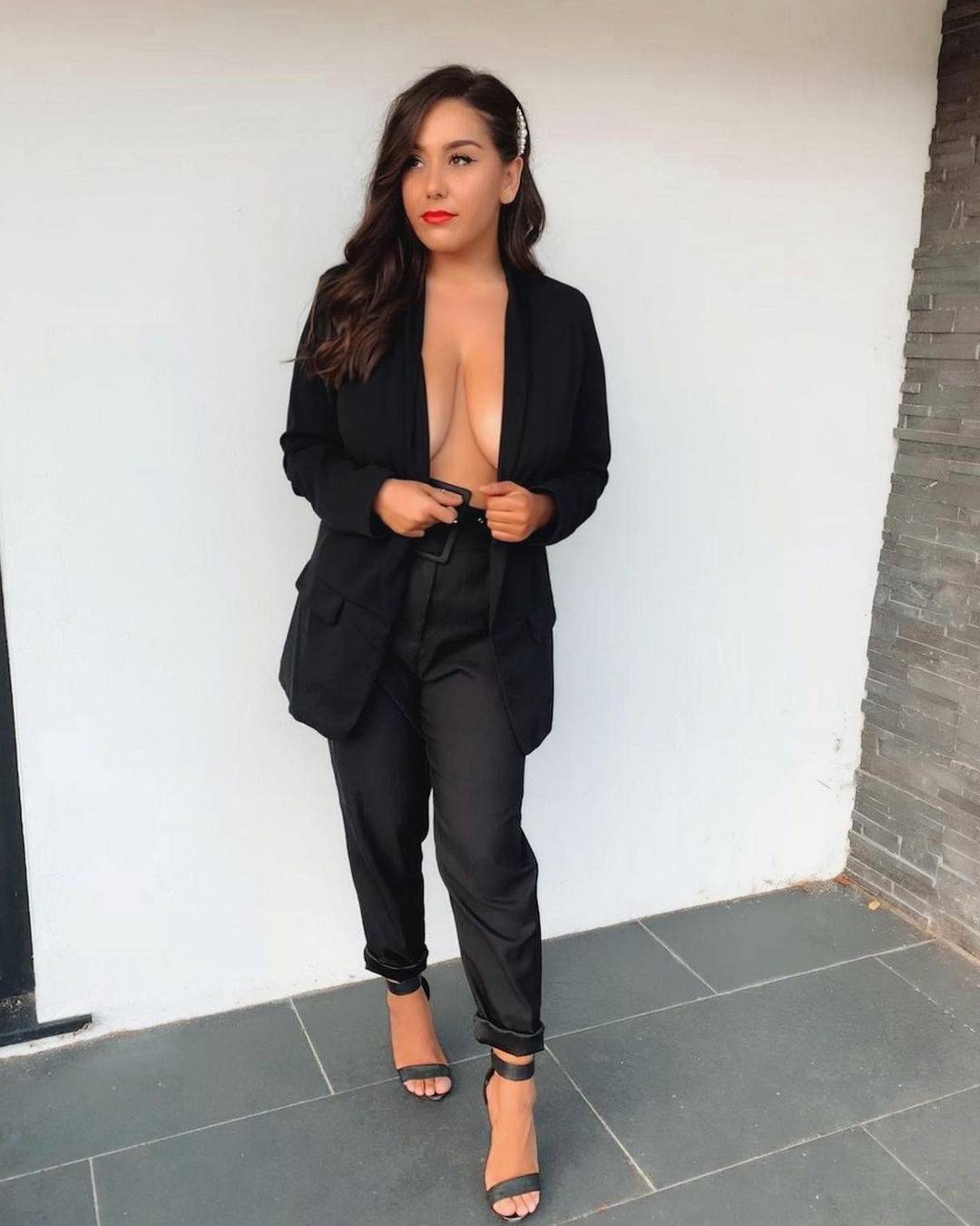 Huge ones covered by her jacket | Scrolller