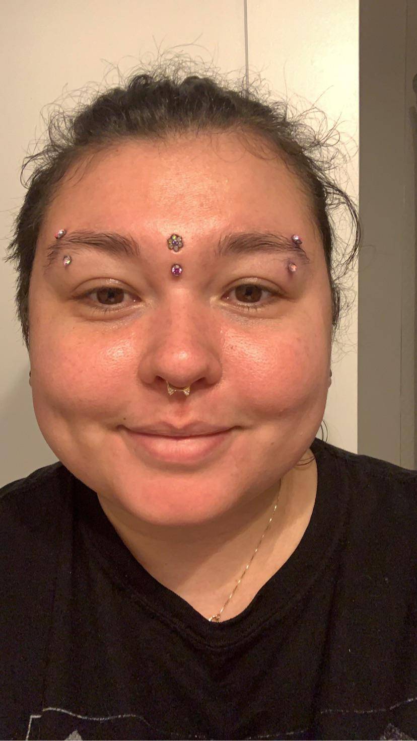 I already posted in r/piercings but here is an update. I got the meow ring from body gems for my ...