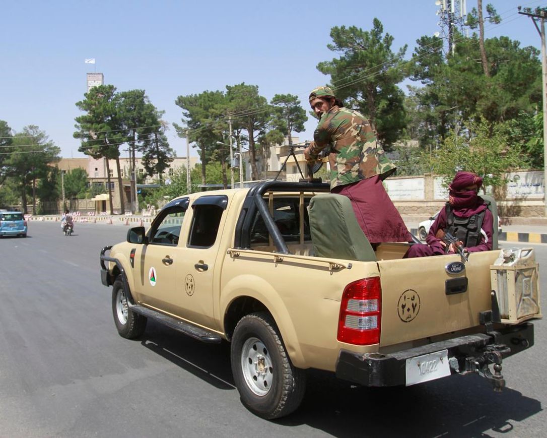 IEA/Taliban with an ex-ANA pickup technical. | Scrolller