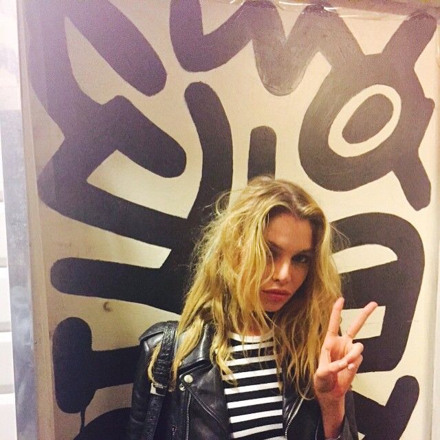 In front of a Keith Haring piece | Scrolller