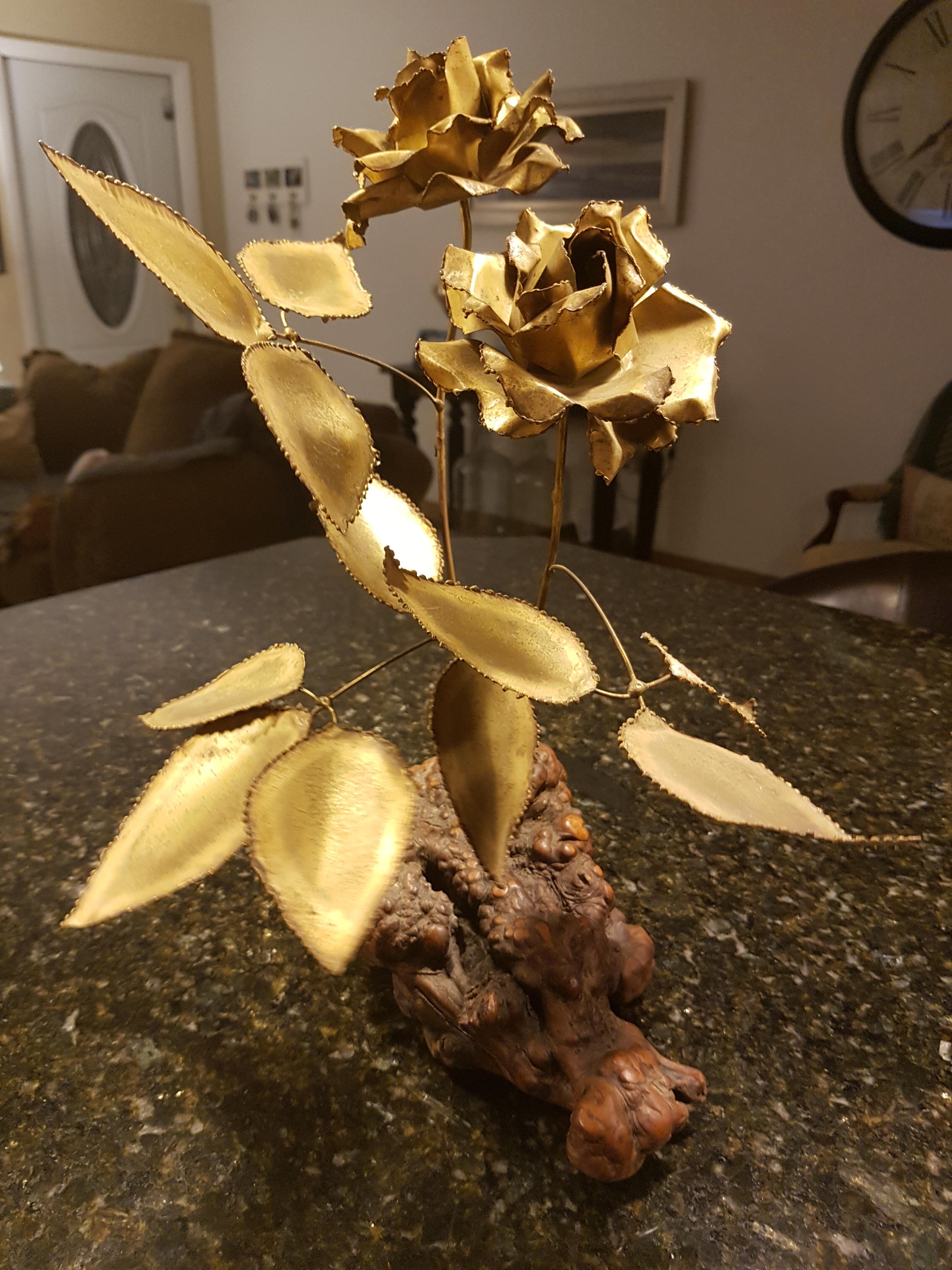 Interesting desk sculpture. Probably brass. Knotted tree root as base. Signed RT 082 underneath ...