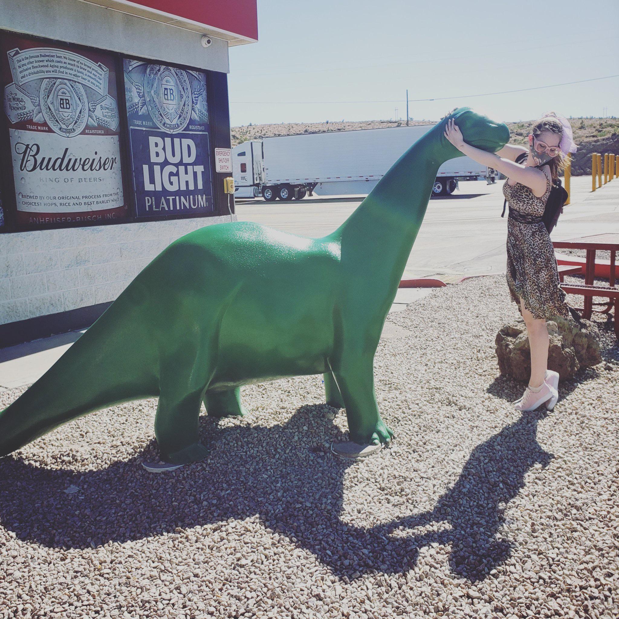 Jenny being romantic with a dinosaur. | Scrolller