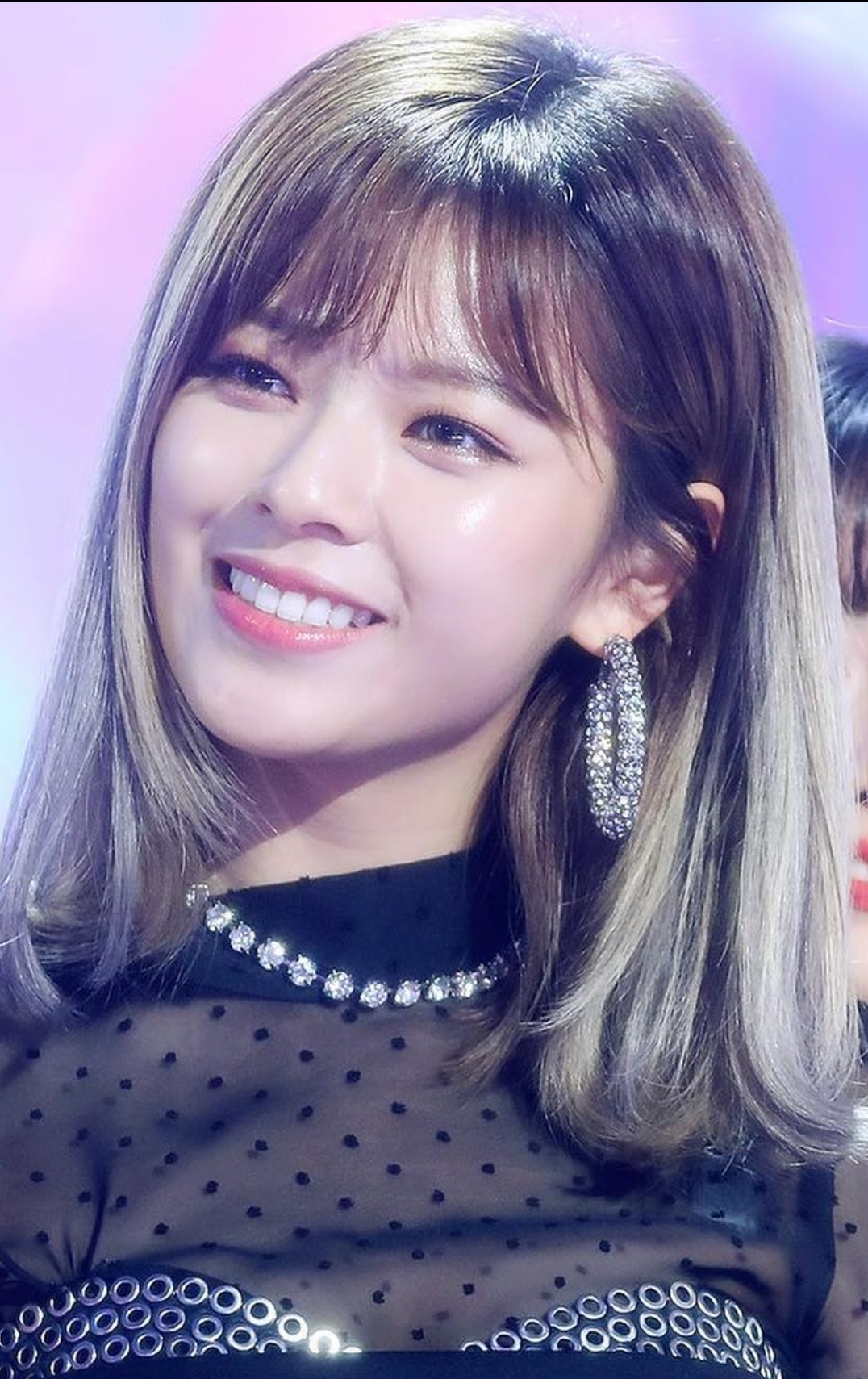 Jeongyeon - blonde highlights, black sheer top, close up | Scrolller