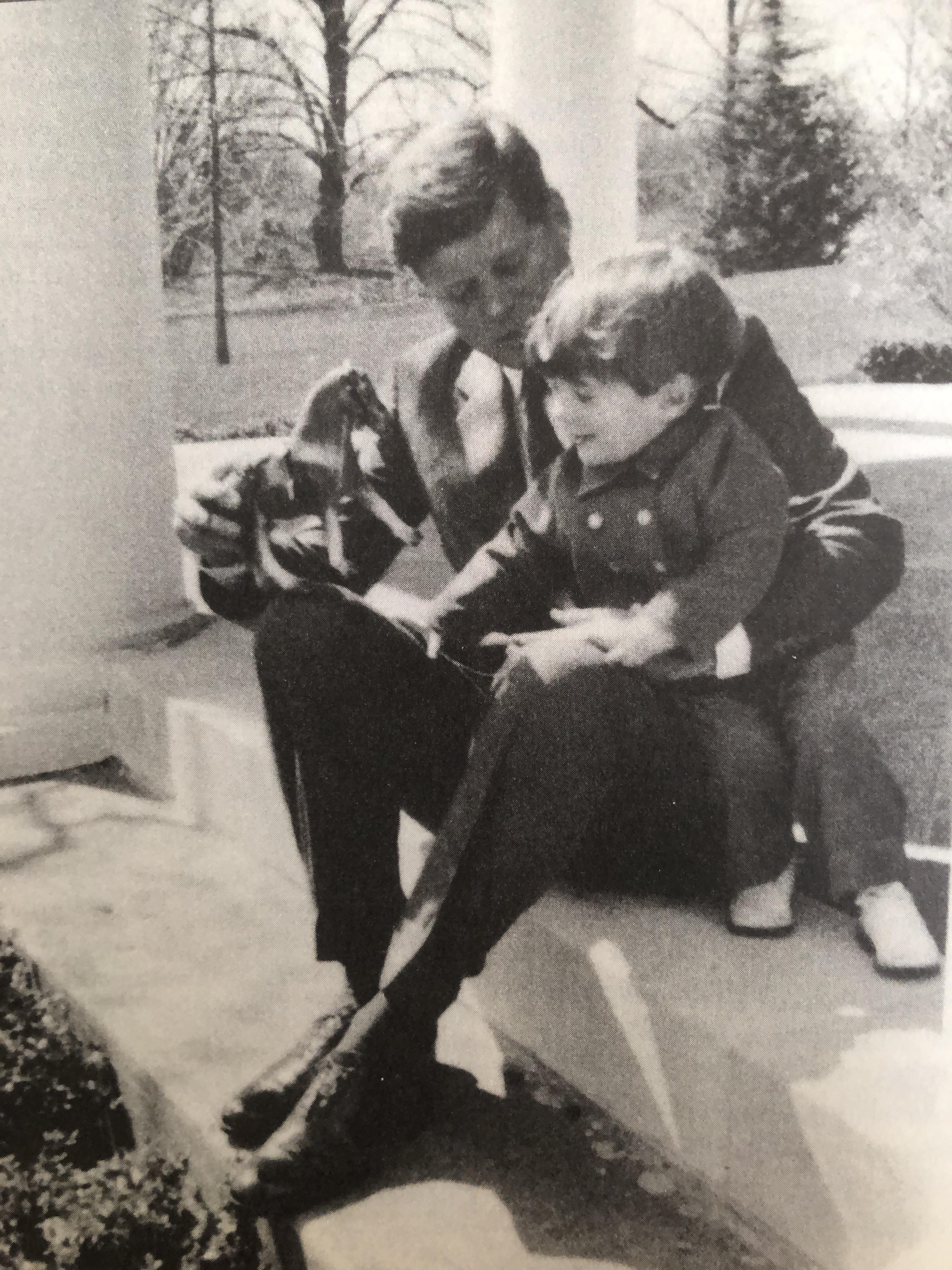 JFK playing with his son (28 March 1963) | Scrolller