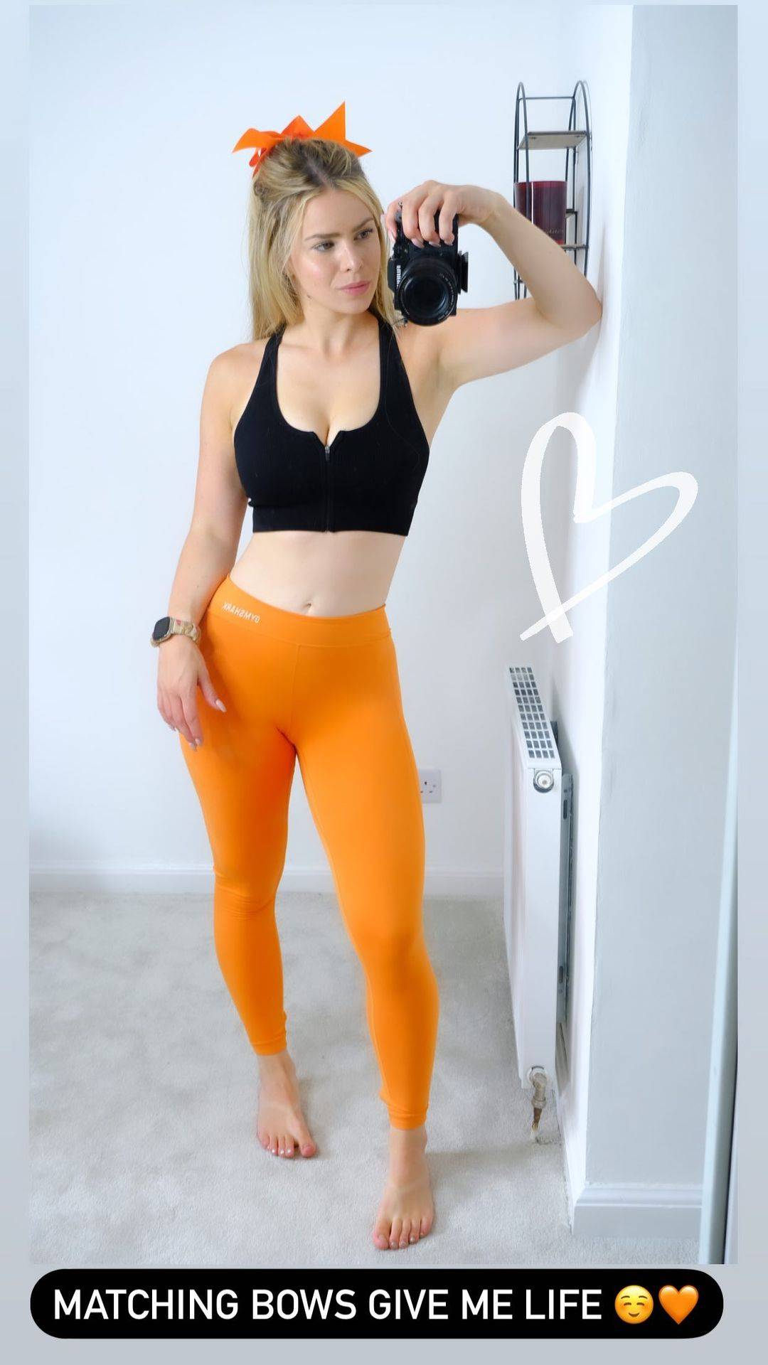 Lauren matching her pants with her bow | Scrolller