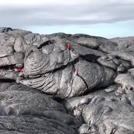 Lava crust splits and magma pours out... | Scrolller