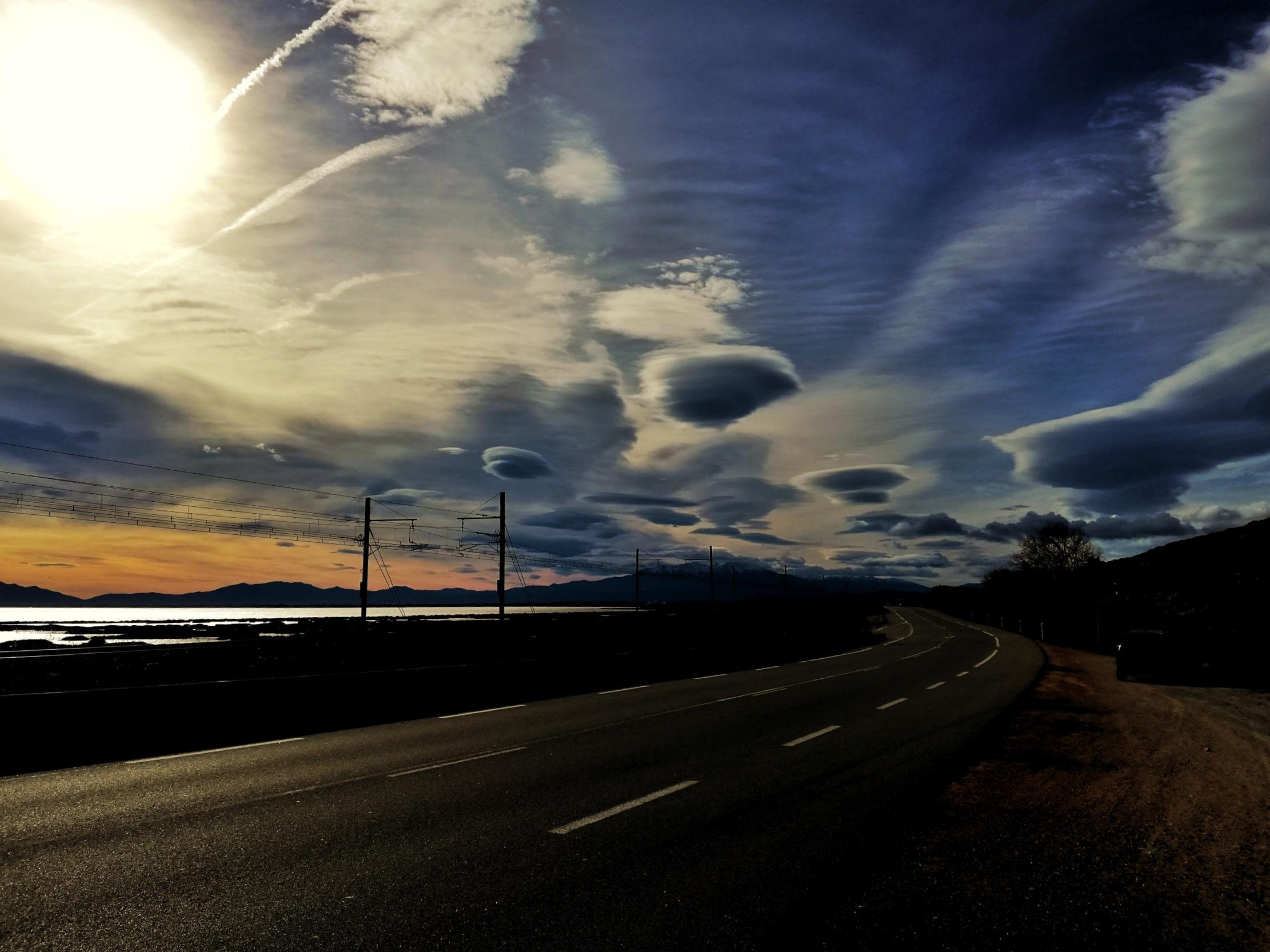 Lenticular clouds over the Pyrenees deen from near Perpignan | Scrolller