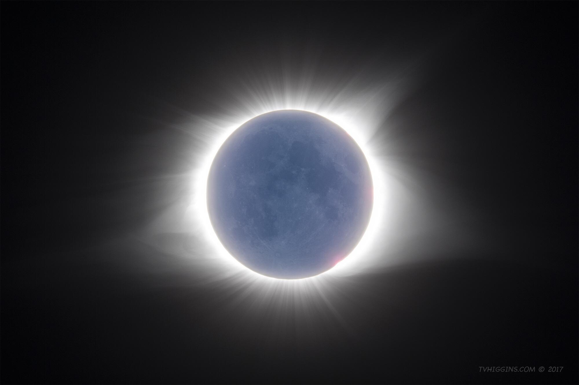 Light from Earth lights up the surface of the moon during the moment of complete totality ...