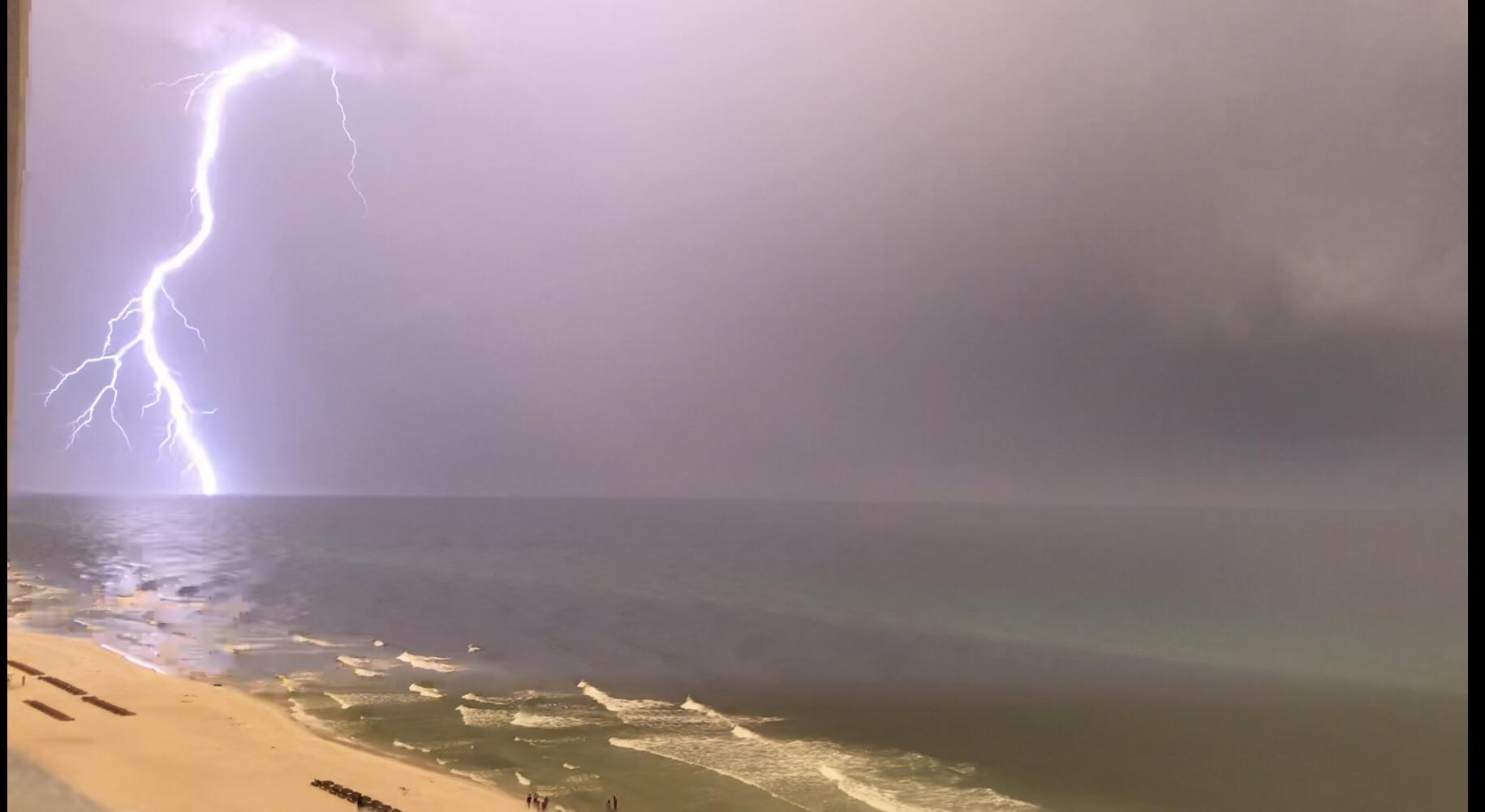 Lightning on the beach | Scrolller