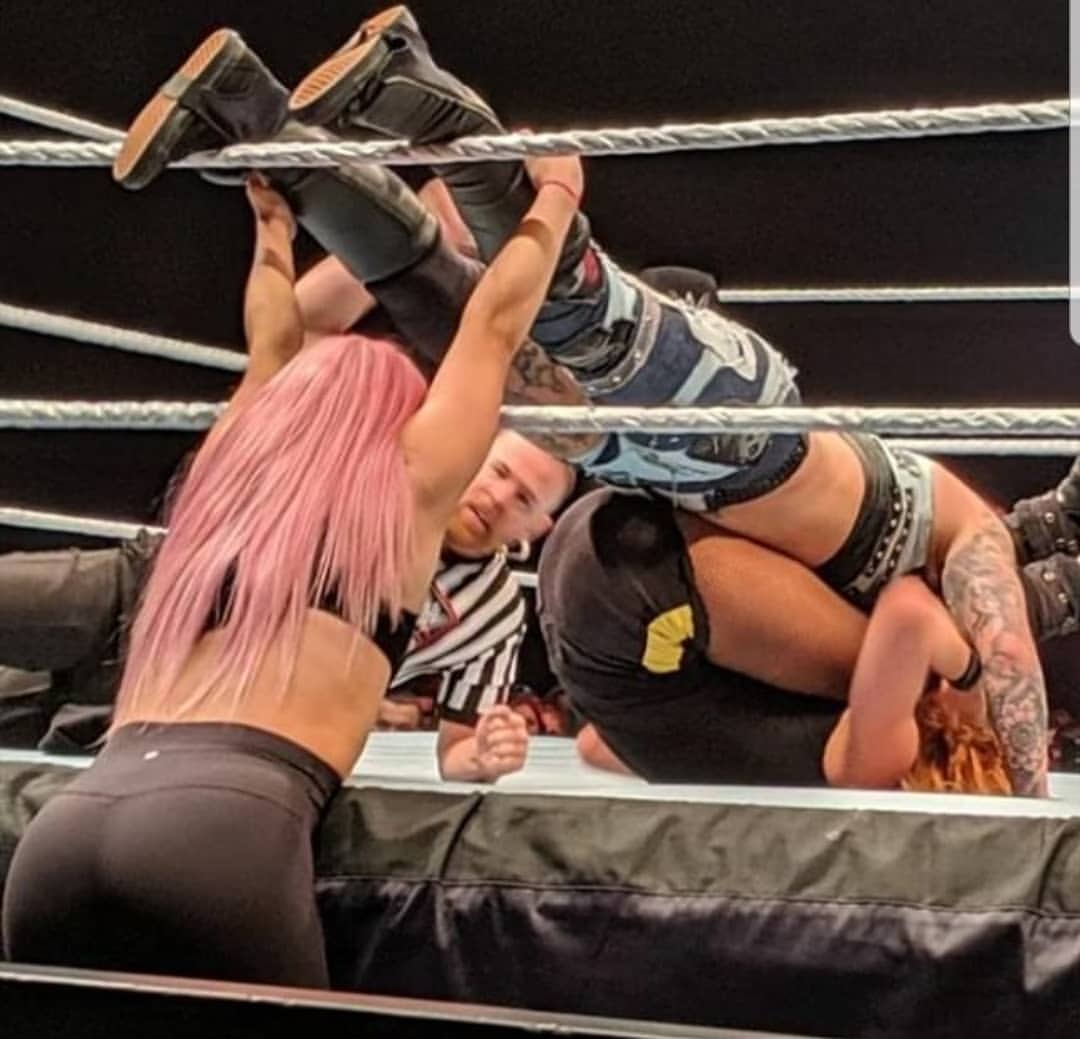 Liv Morgan giving Ruby an assist in pinning Becky | Scrolller