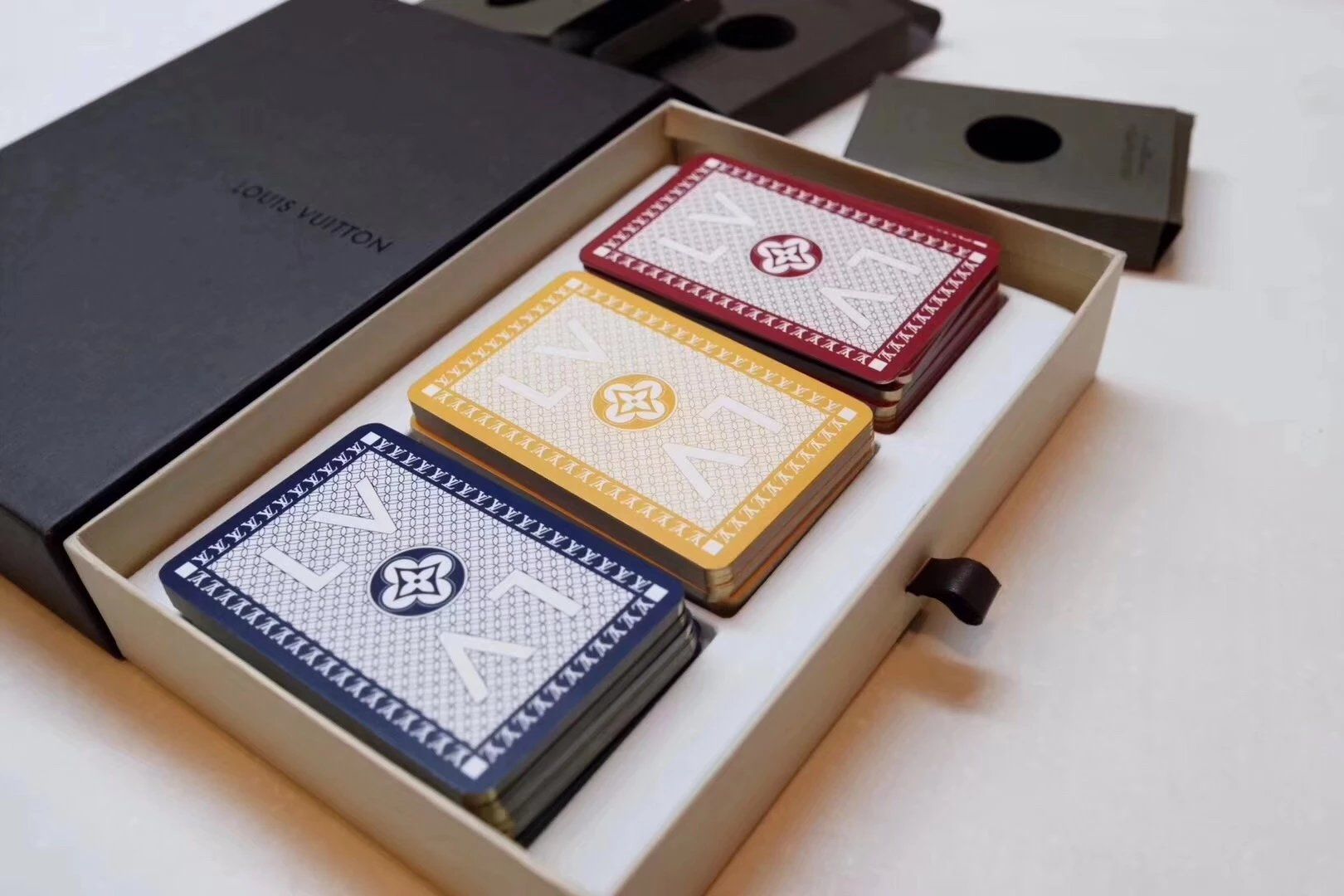 LV Playing Cards and Gucci Umbrellas | Scrolller