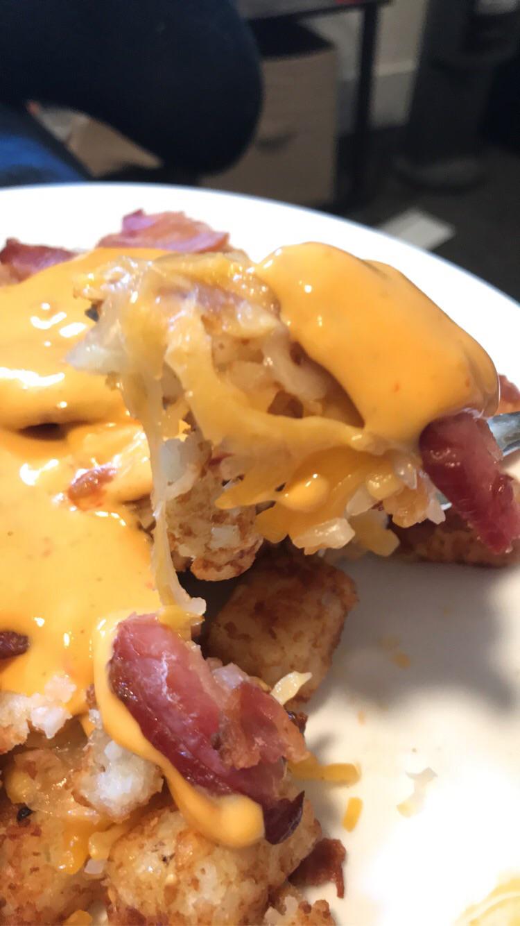 Made some loaded tots with bacon, 4 cheese blend, queso, and sour cream | Scrolller