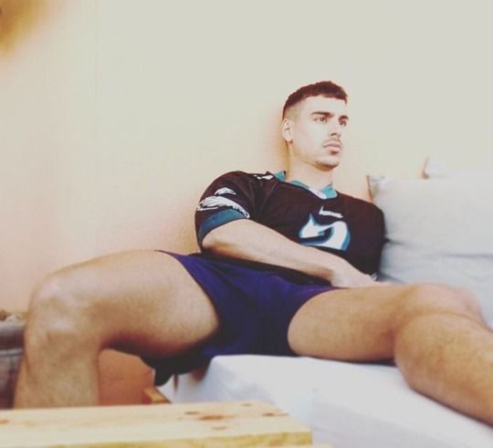 Man spread on bed | Scrolller