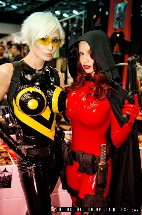 Marie-Claude as Hornet with Bianca Beauchamp as Crimson | Scrolller