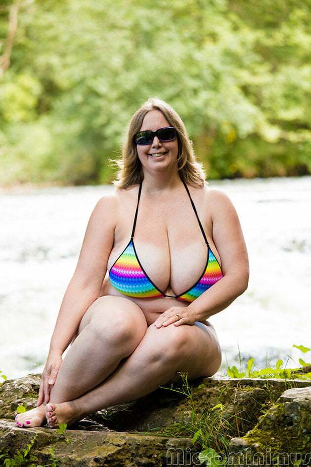 Massive pair in a tiny colorful bikini | Scrolller