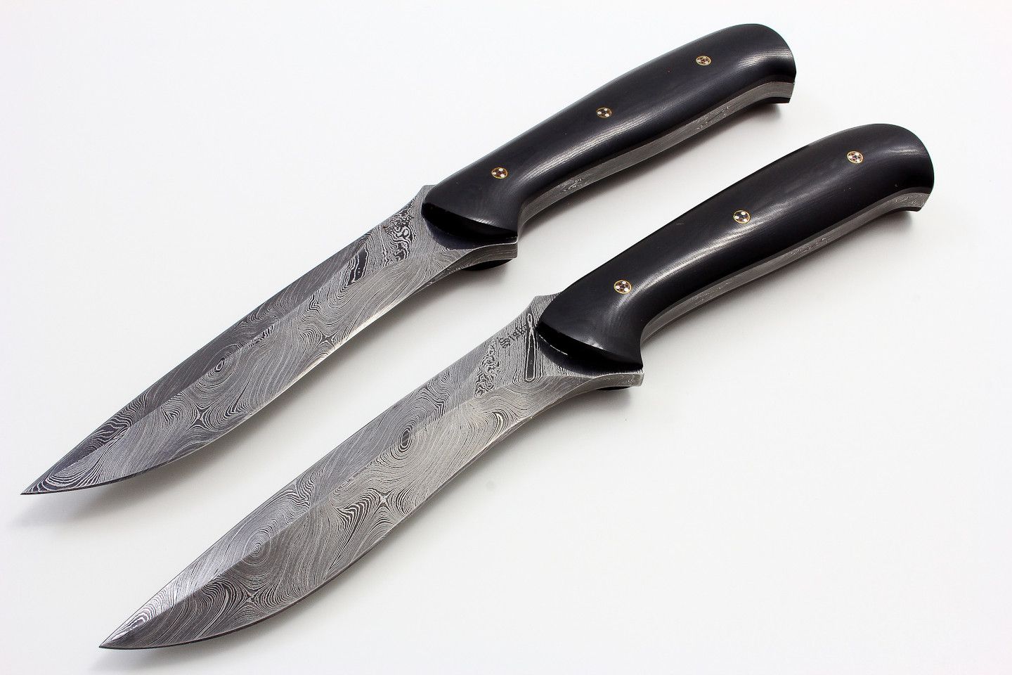 Matched pair of beautiful double-edged recurve damascus fighters by Jim Siska [1440x960] | Scrolller