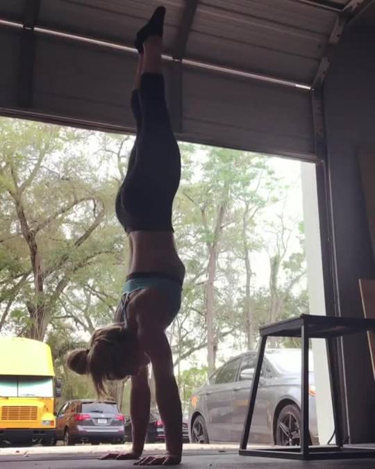 Mattie Rogers | handstand toe touches | Scrolller