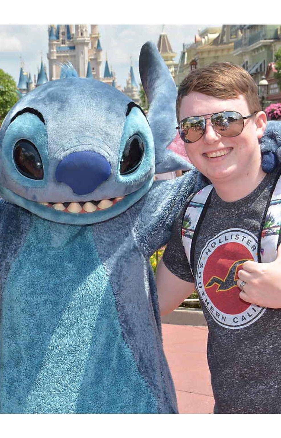 Me (5'2) standing with animated film legend Stitch (~3'0) | Scrolller