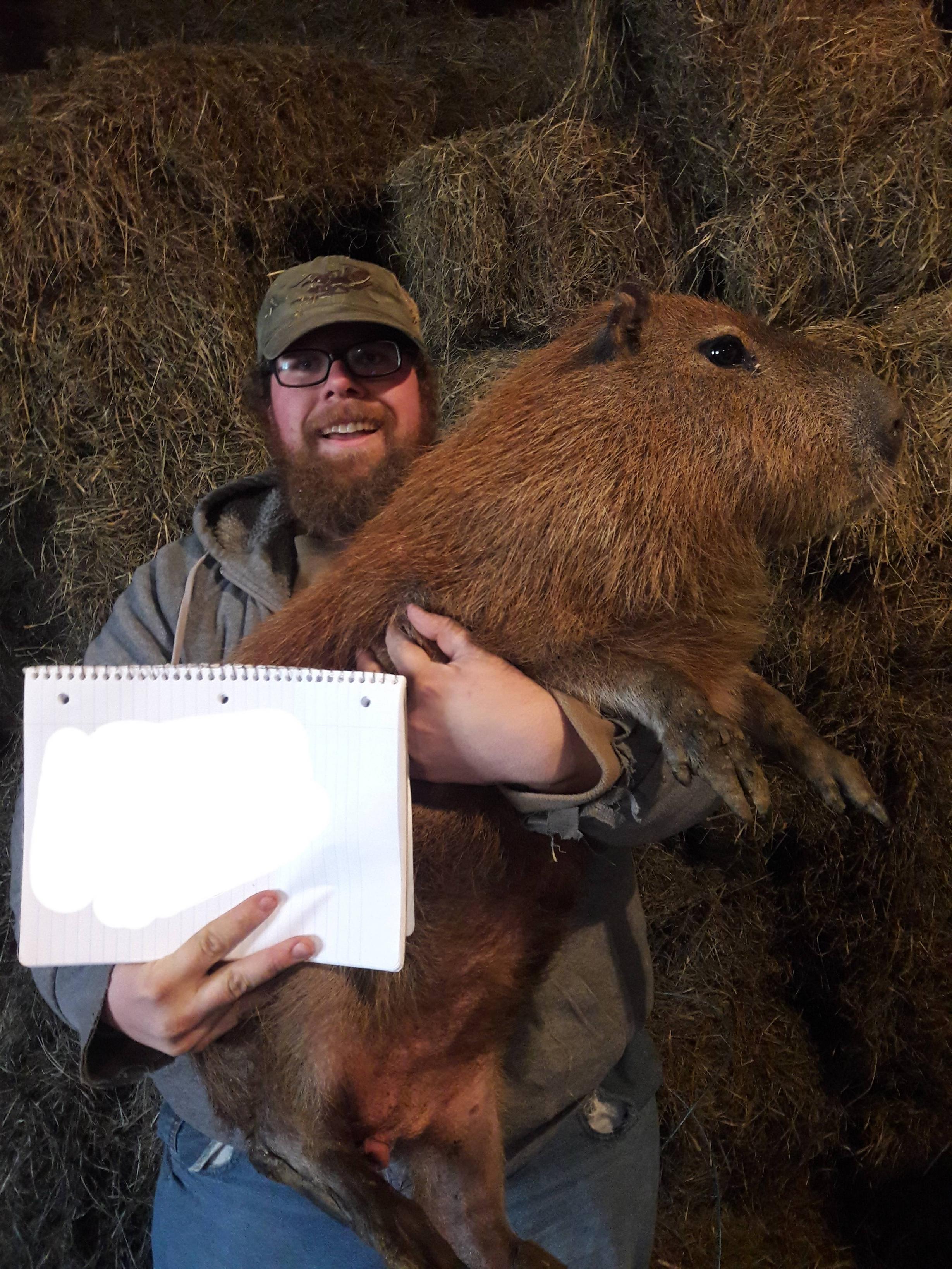 Me holding a capybara | Scrolller