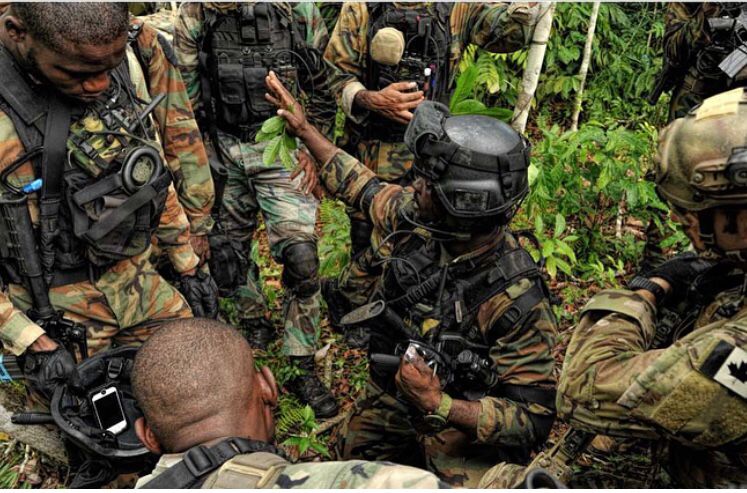 Members of the Jamaica Defence Force take part in a training exercise at the Caribbean Special ...