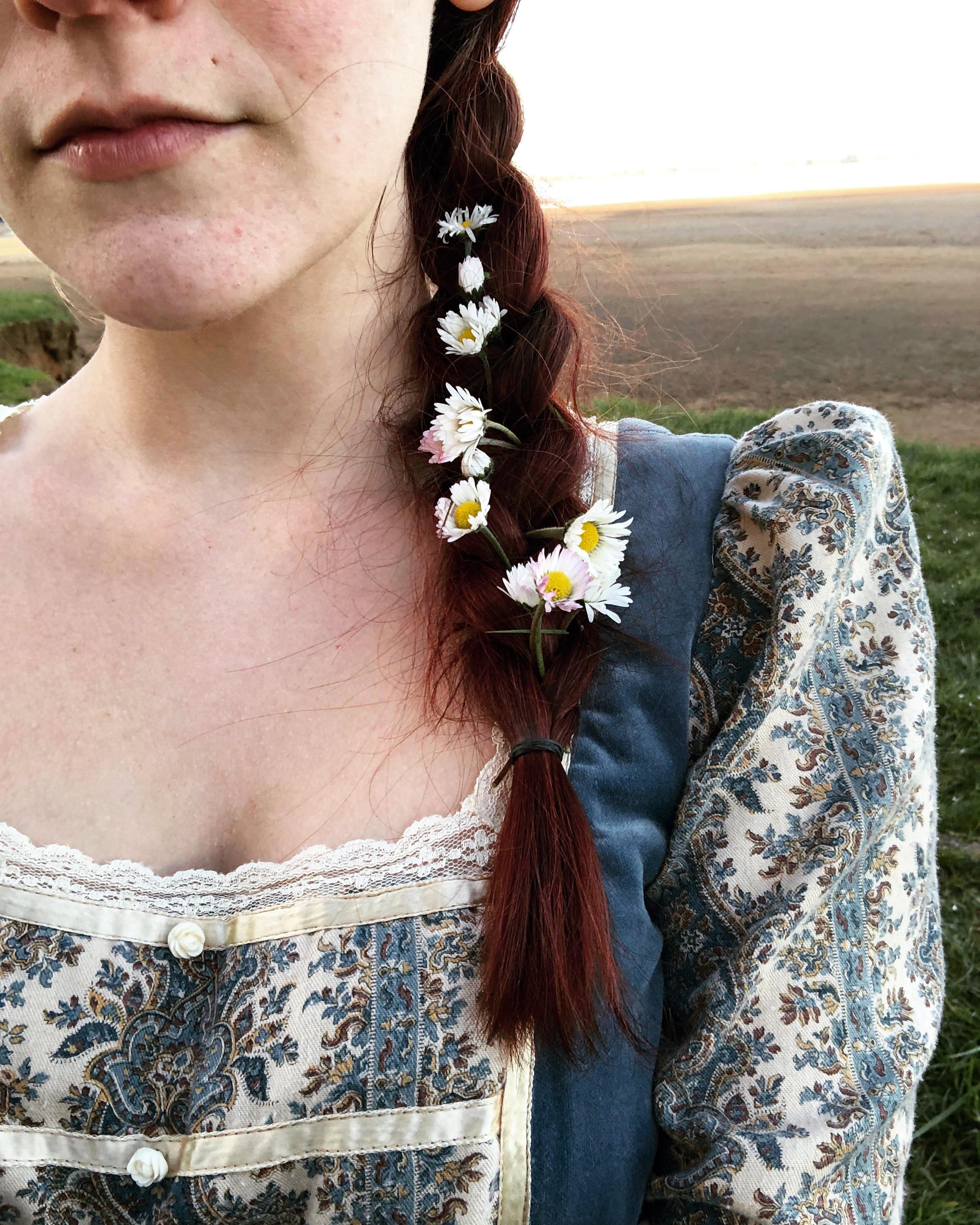 Messy braid but I love putting flowers in it! I learned how to braid in Girl Scouts, what about ...