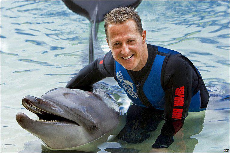 Michael Schumacher and His Happy-Looking Dolphin | Scrolller
