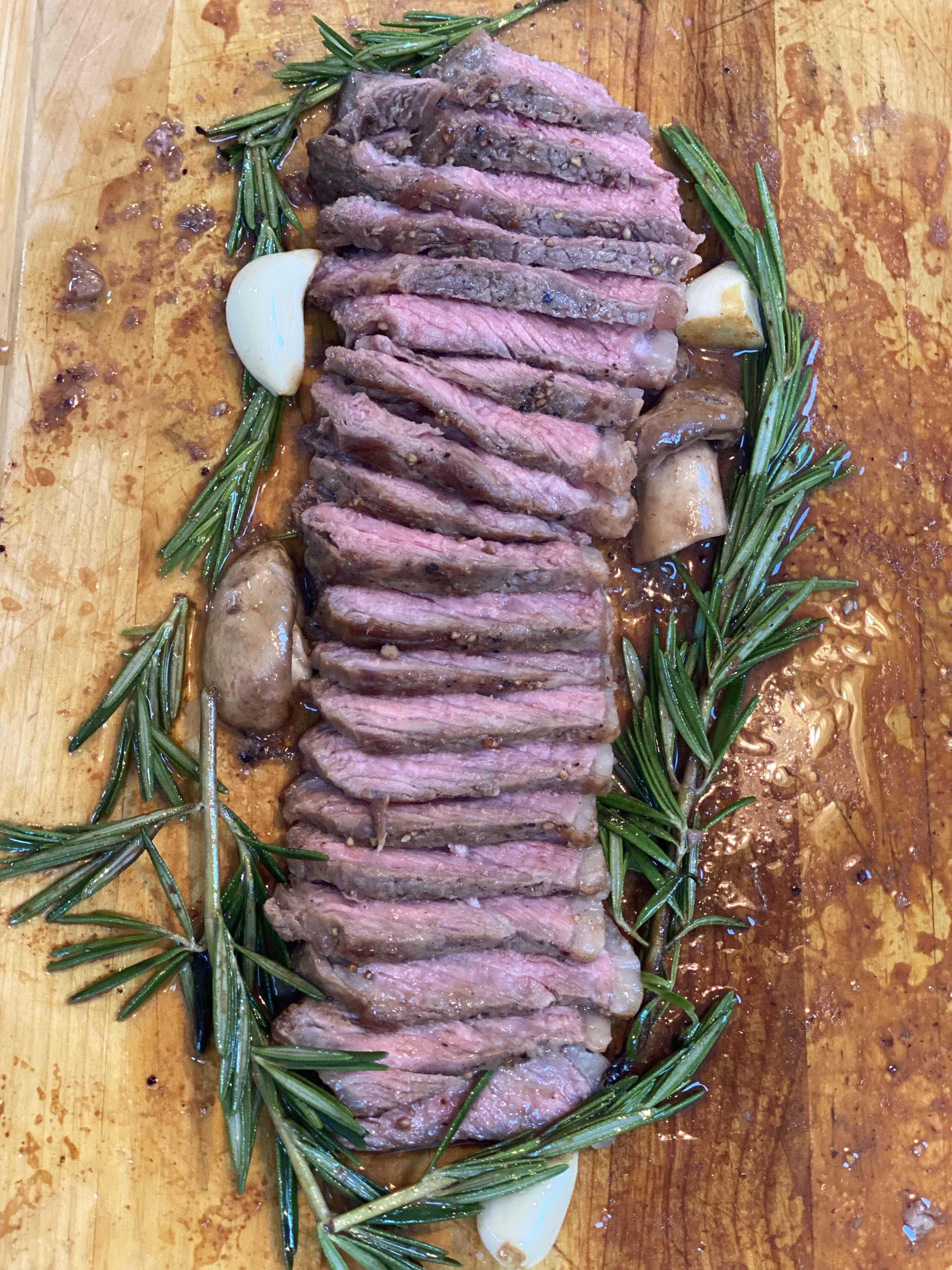Mushroom garlic rosemary butter basted strip steak | Scrolller