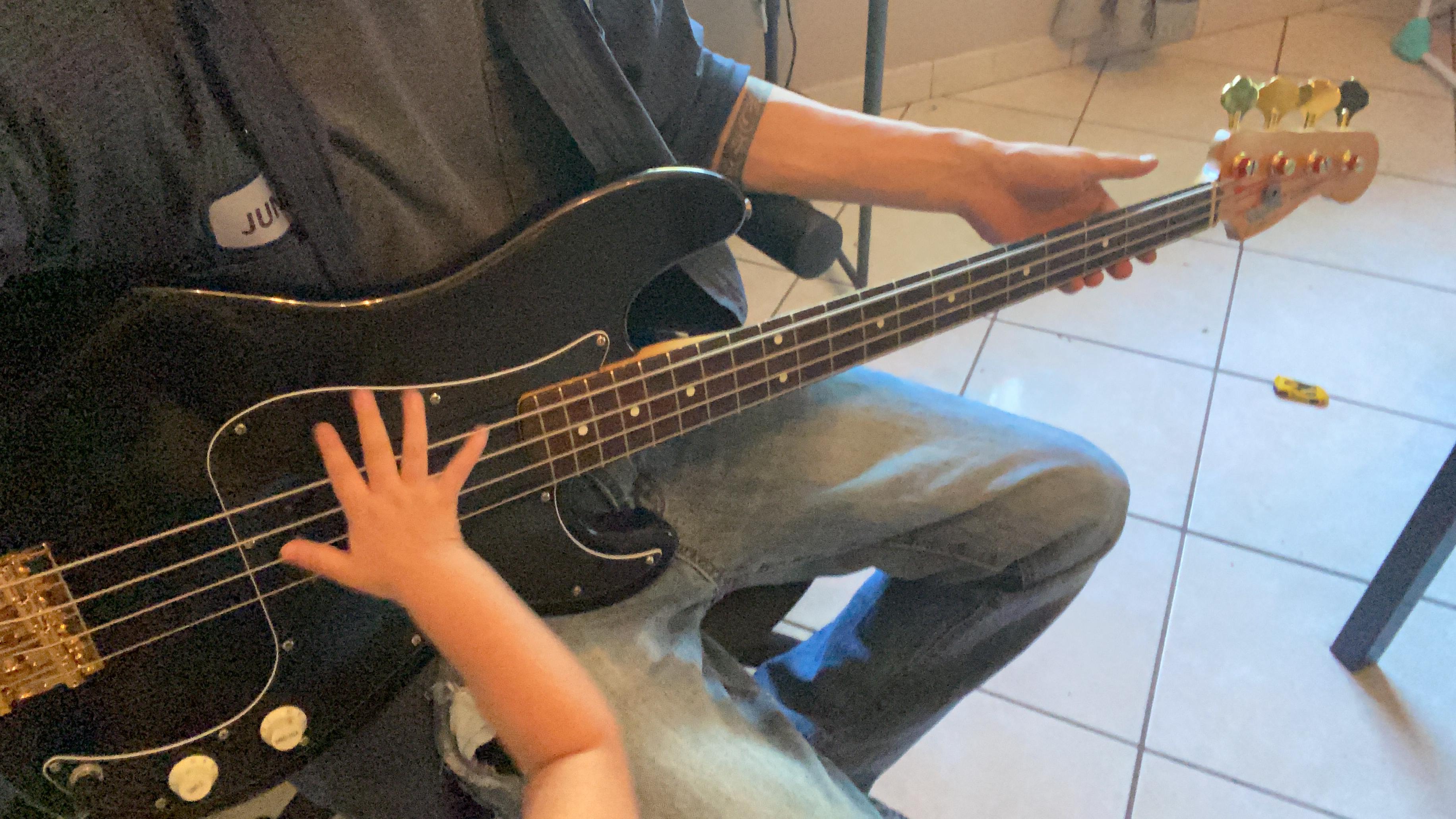 my daughter helping me out on my 94 fender p bass | Scrolller