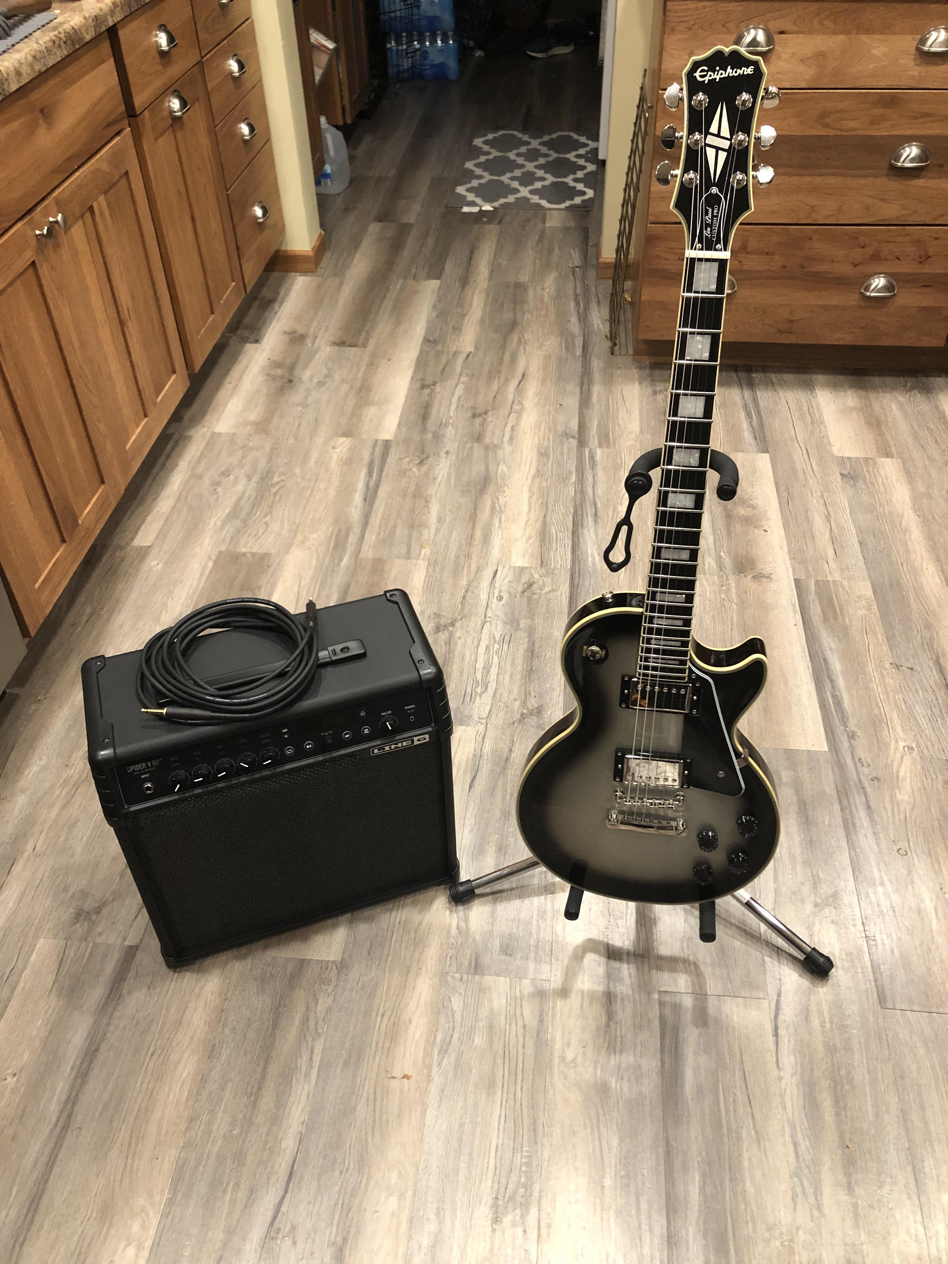 My first electric (les Paul custom pro tuxedo with a line 6 spider v60 amp) | Scrolller