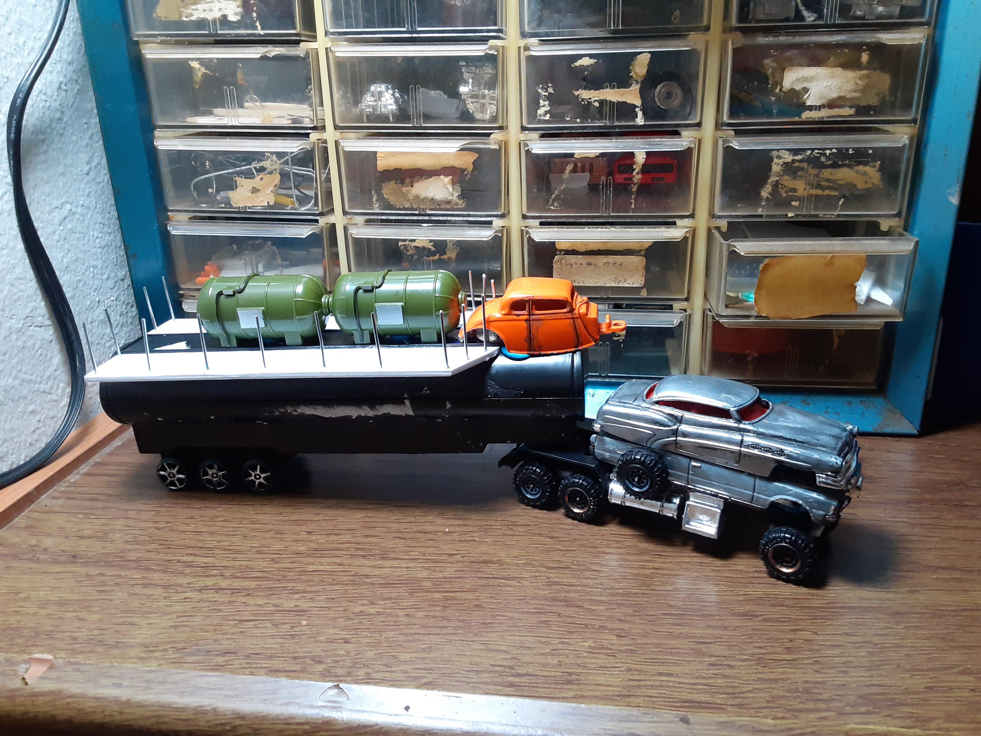 My first scratch built war rig. Fuel tanker/ mobile fueling platform. Input welcome, as I said ...