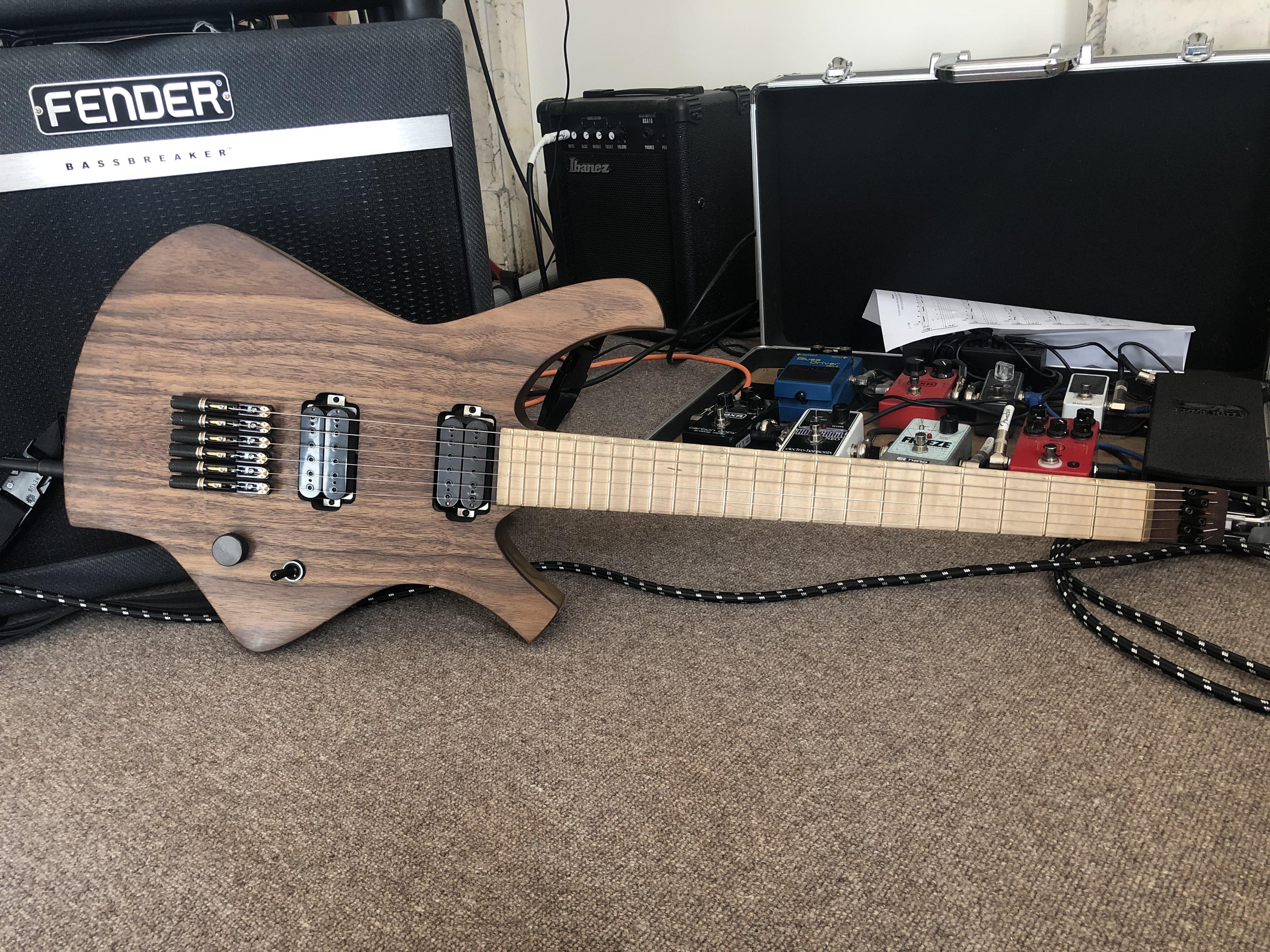 My first solo build. A headless 6 string electric. | Scrolller