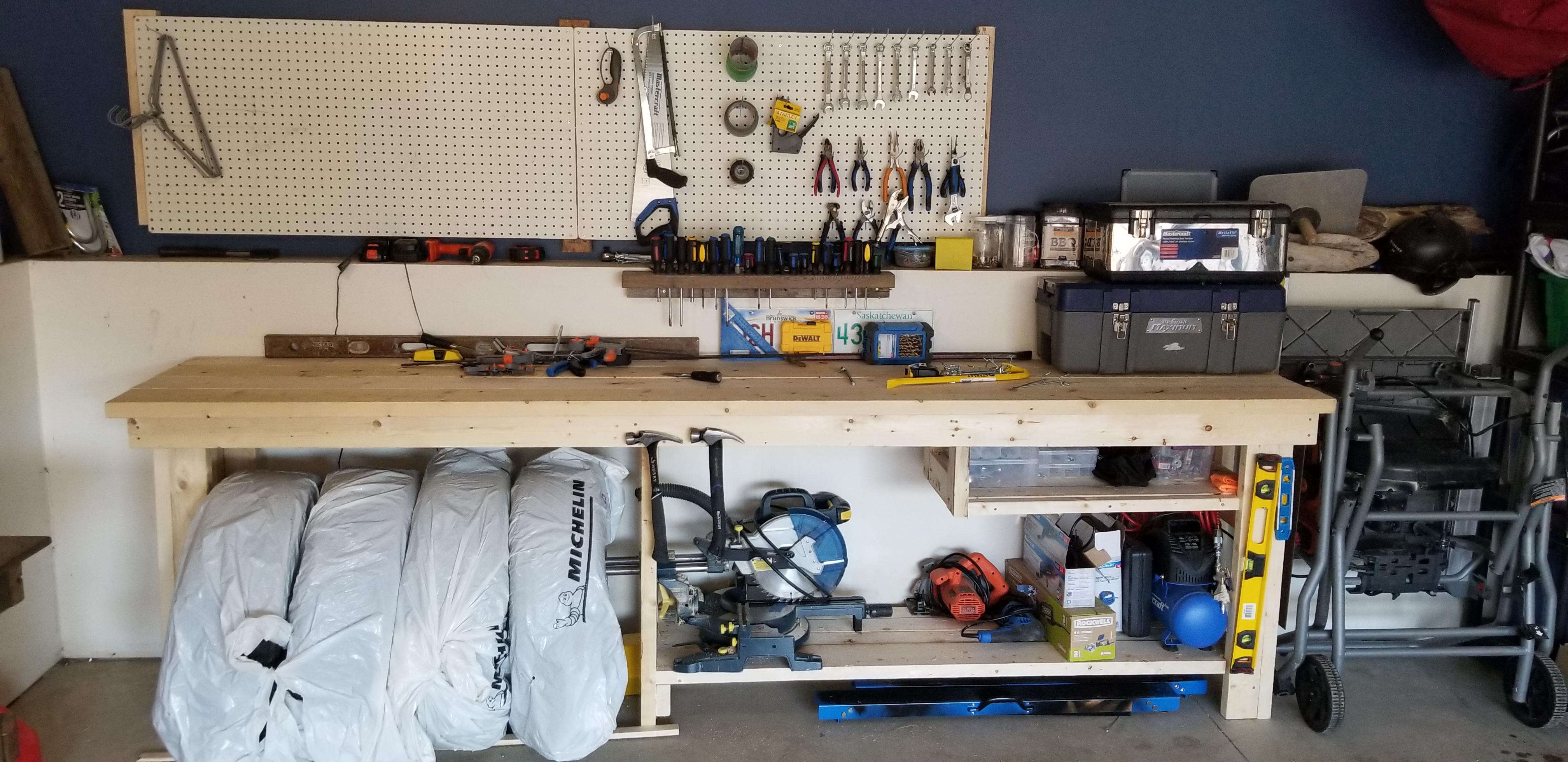 My first workbench! 10ft long, pretty happy with how it turned out. Still working on getting ...