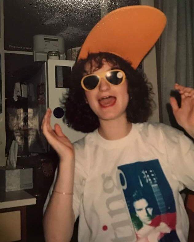 My Mom, sometime in the 80s, with her big Goofy hat | Scrolller